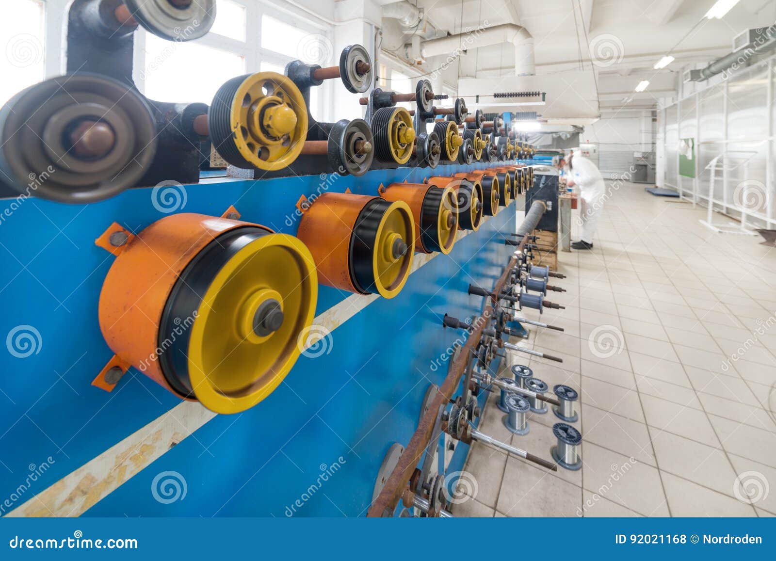 Rotating Rubberized Wheels of the Winding Machine. Stock Photo - Image ...