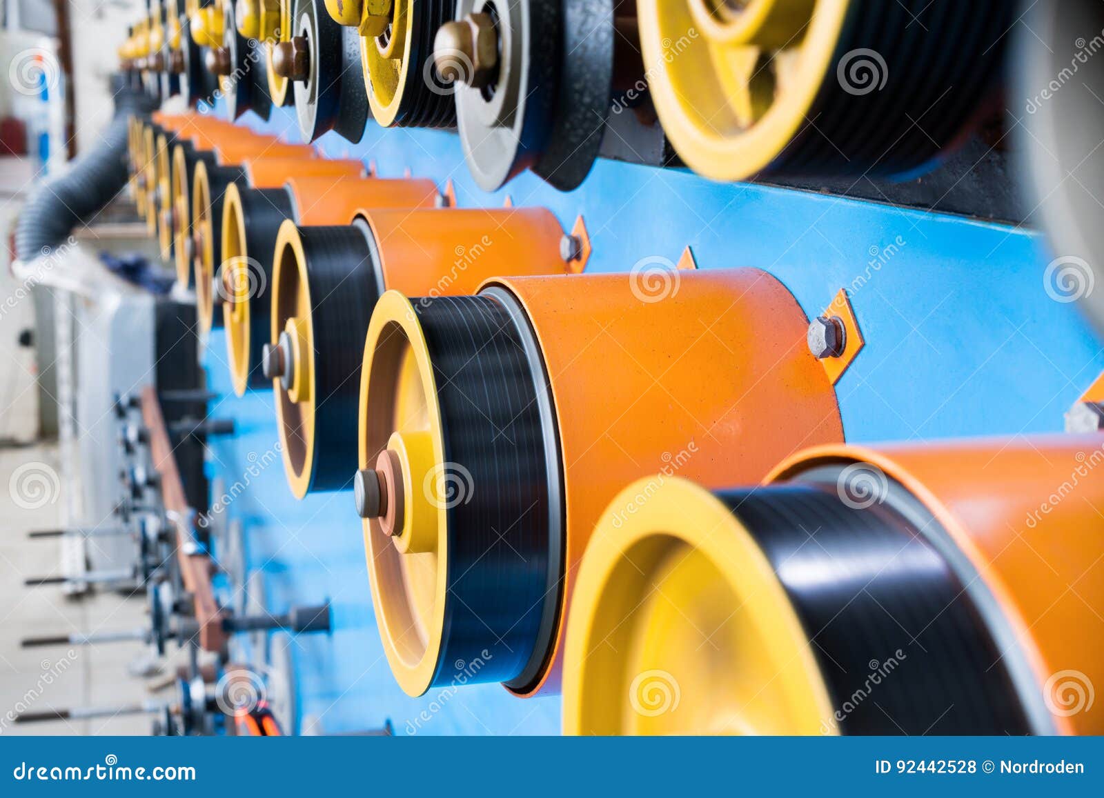 Rotating Rubberized Wheels of the Winding Machine. Stock Photo - Image ...