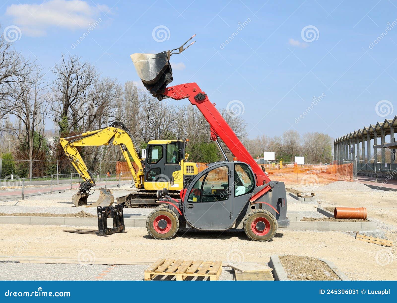 Telehandler On A Construction Site, Preparing To Raise Construction ...