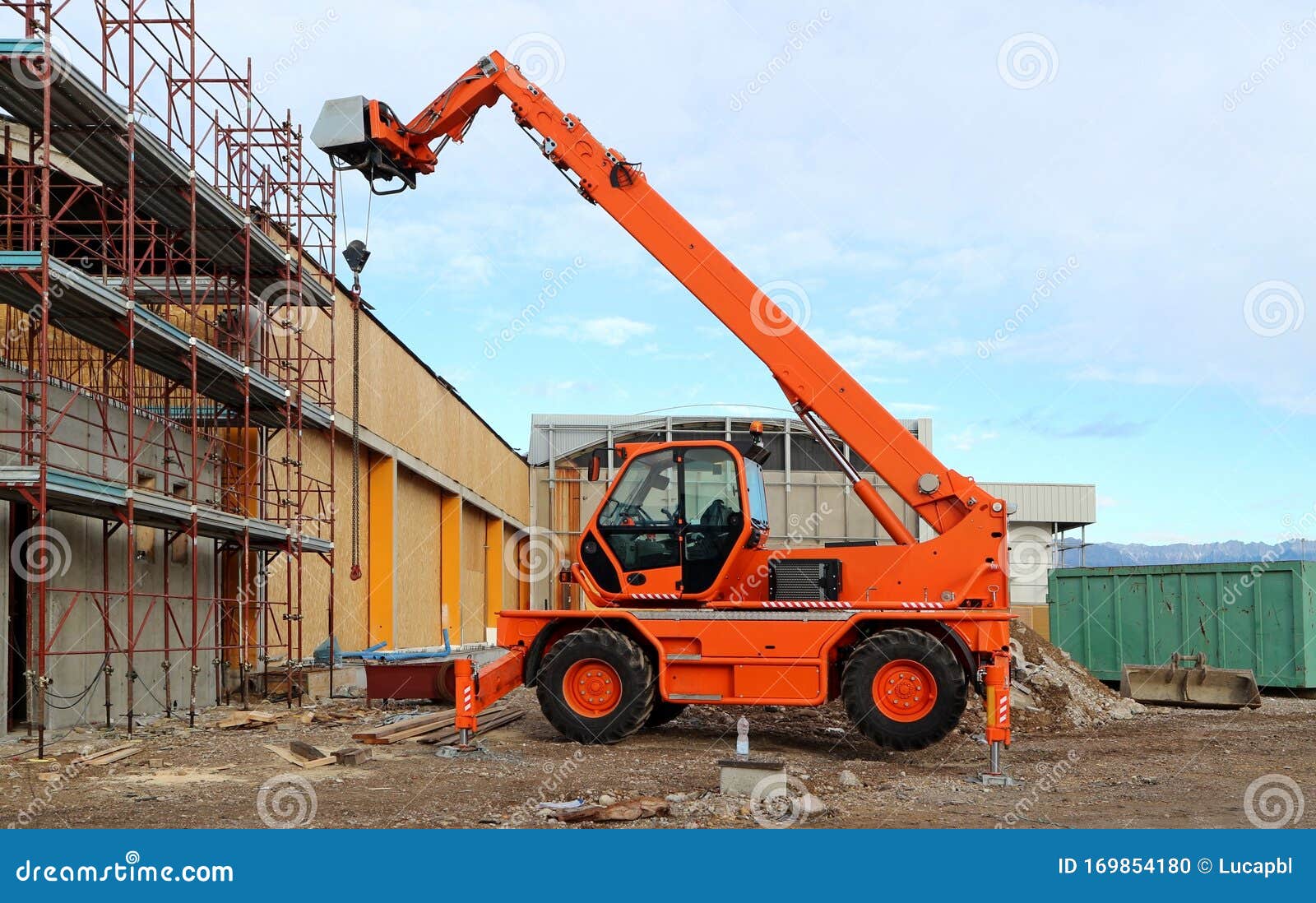 Rotating Telehandler at Work in an Industrial Redevelopment Area. Stock ...
