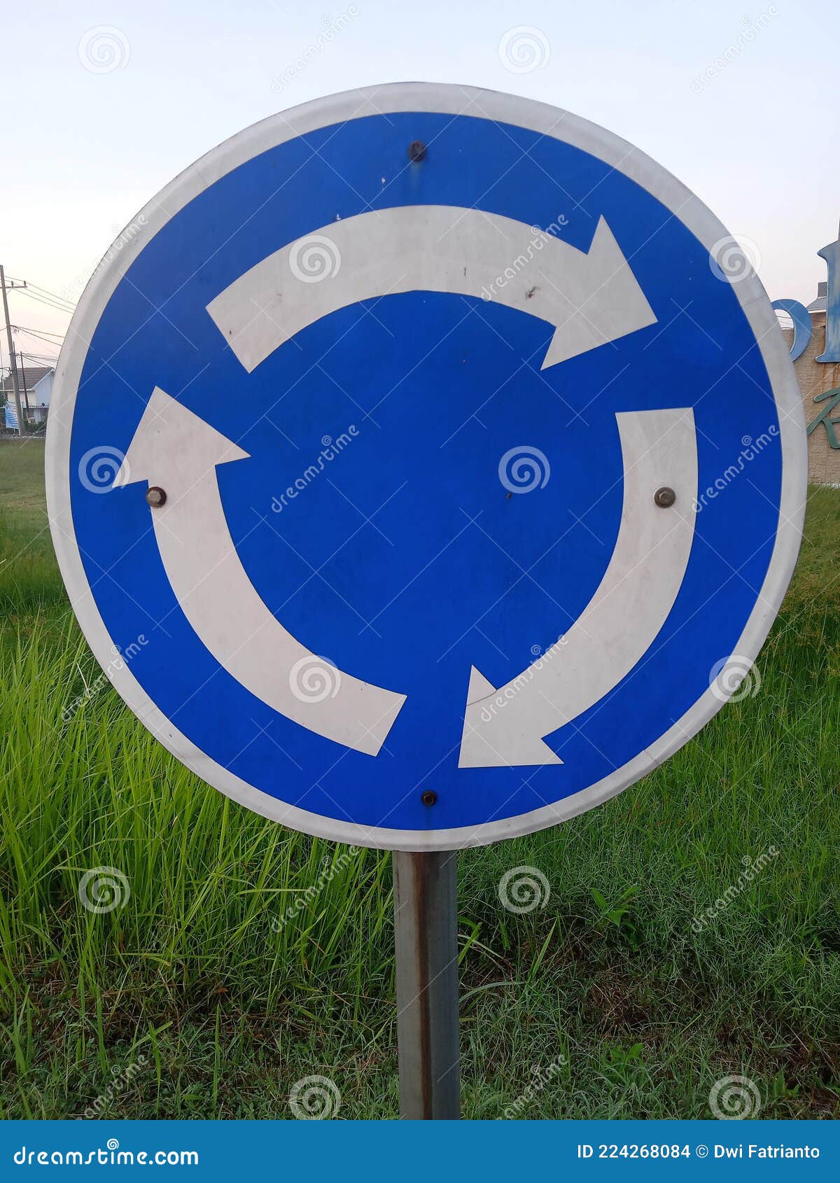 Rotation Sign with White Arrow and Blue Circle Stock Photo - Image of ...