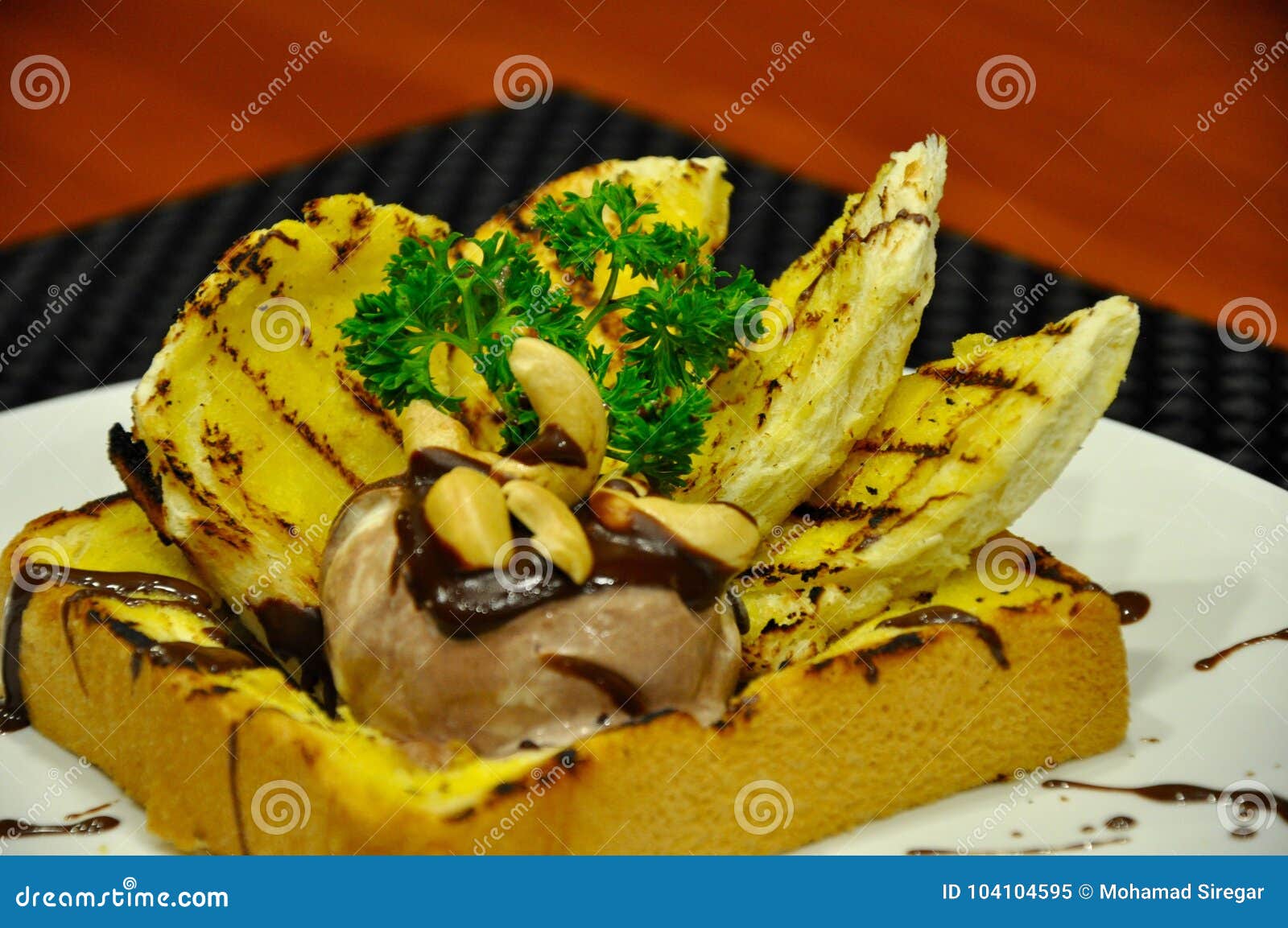 Roti Bakar Kacang Mede Served with Ice Cream Stock Image - Image of ...