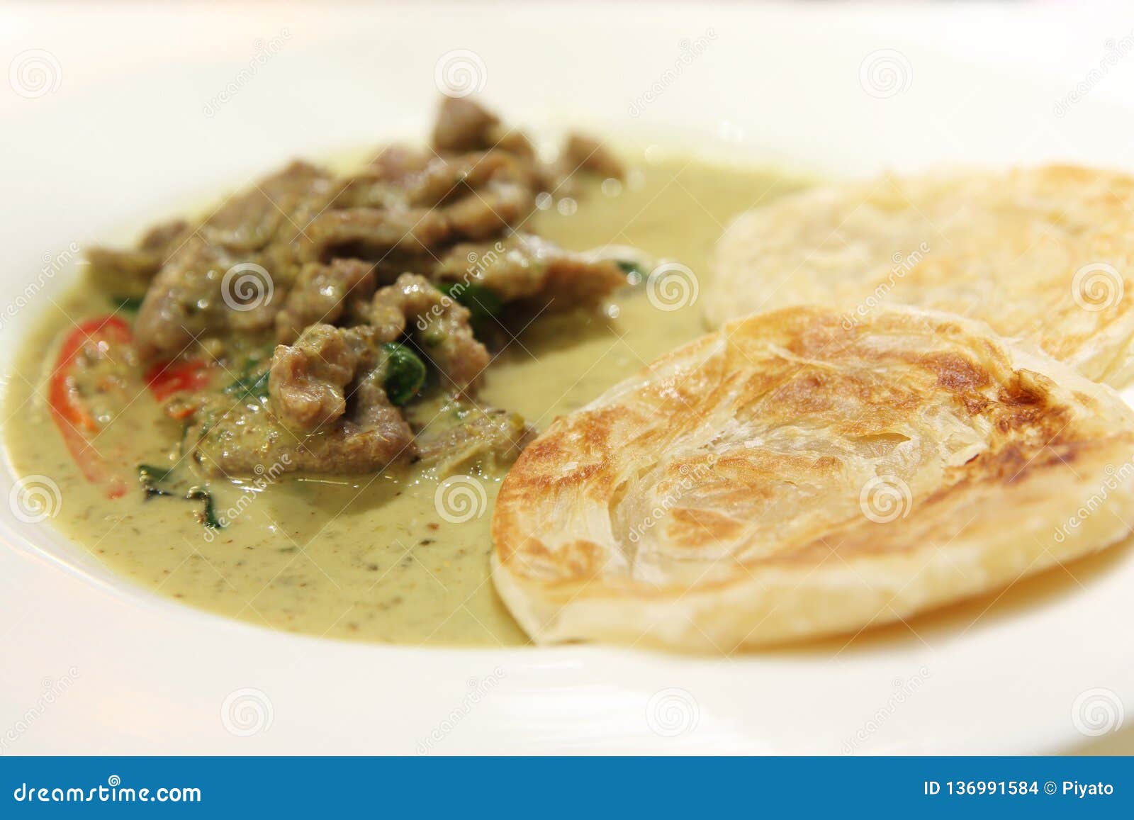 Roti with beef green curry stock photo. Image of cuisine - 136991584