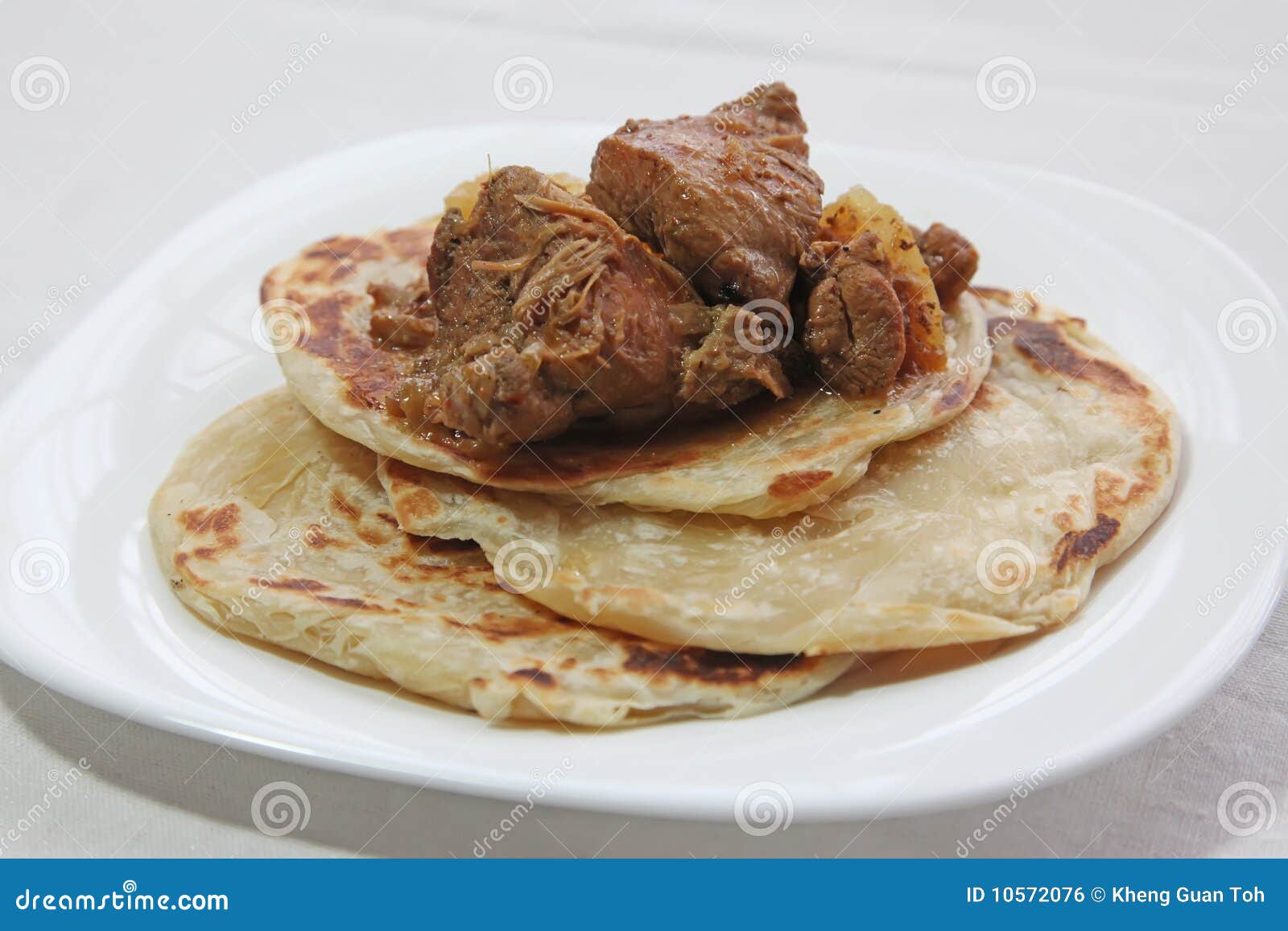 Roti canai prata stock photo. Image of staple, food, flat - 10572076