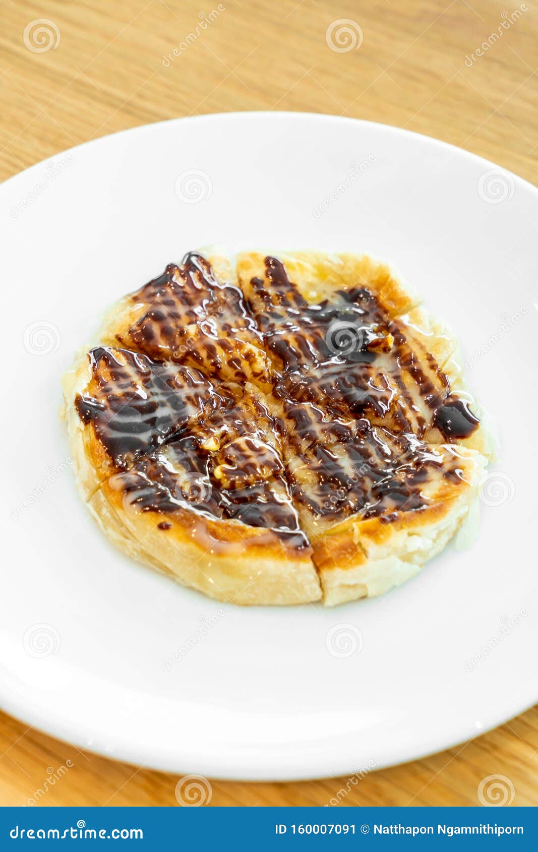 Roti with chocolate sauce stock image. Image of chocolate - 160007091