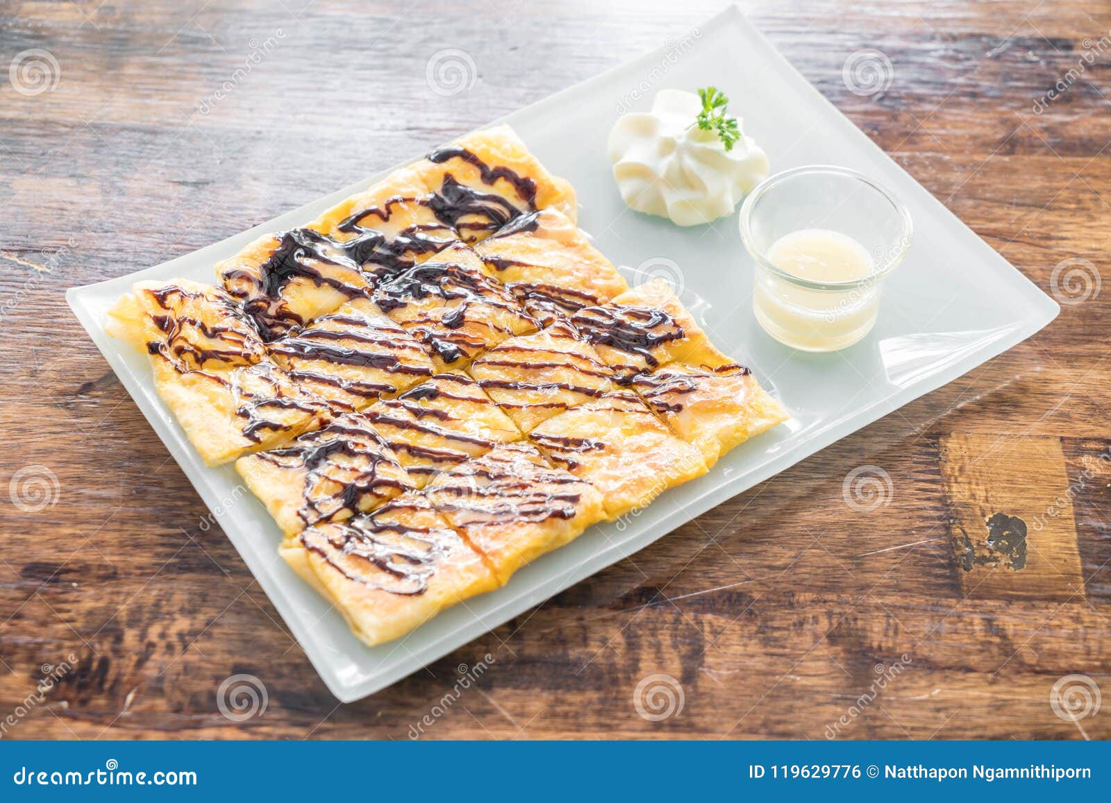 Roti with chocolate sauce stock photo. Image of milk - 119629776