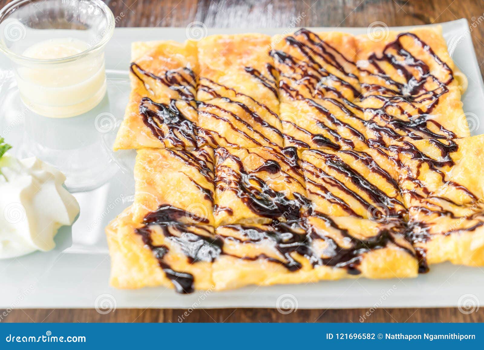 Roti with chocolate sauce stock photo. Image of meal - 121696582