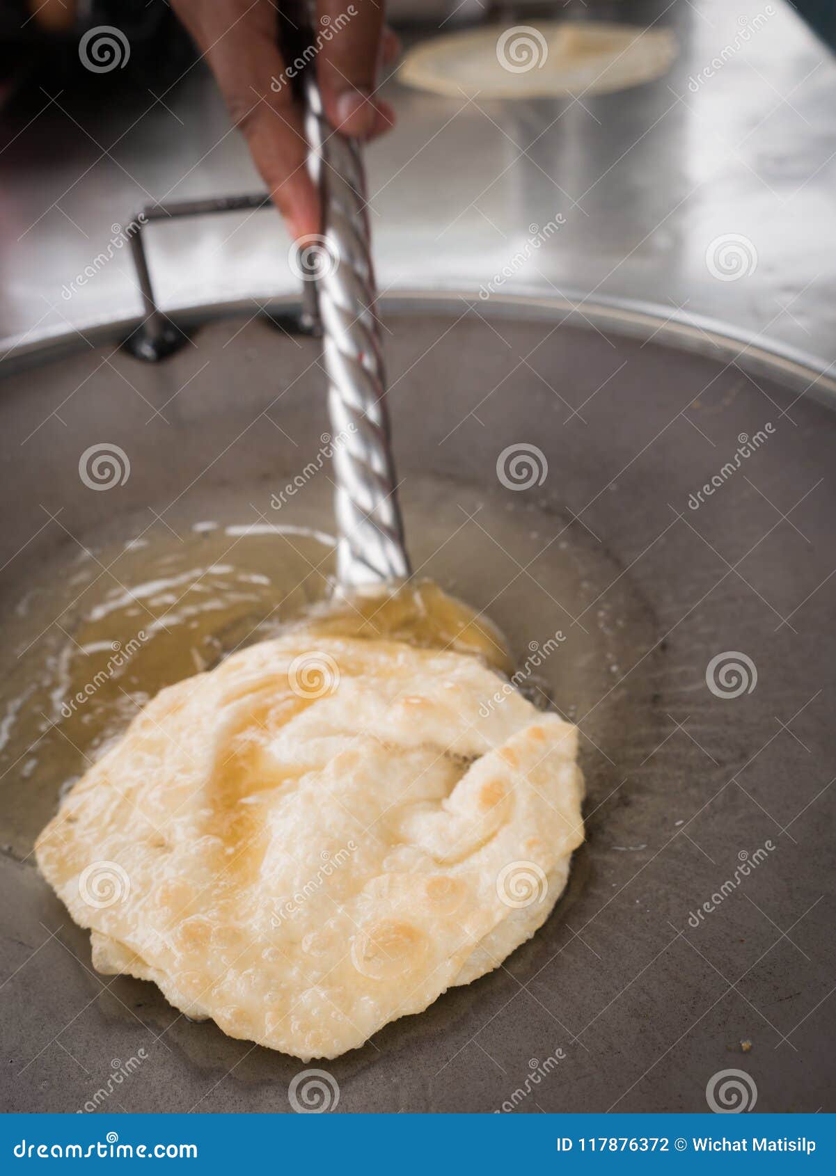 Roti Fried in Oil on the Stove Stock Photo - Image of delicious, gray ...