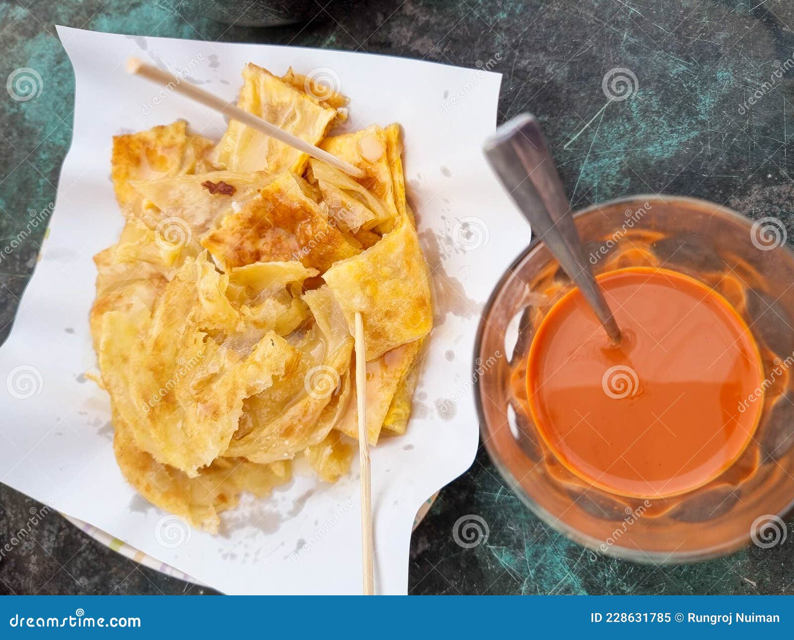 Roti and Hot Thai Tea on Green Table Stock Image - Image of traditional ...
