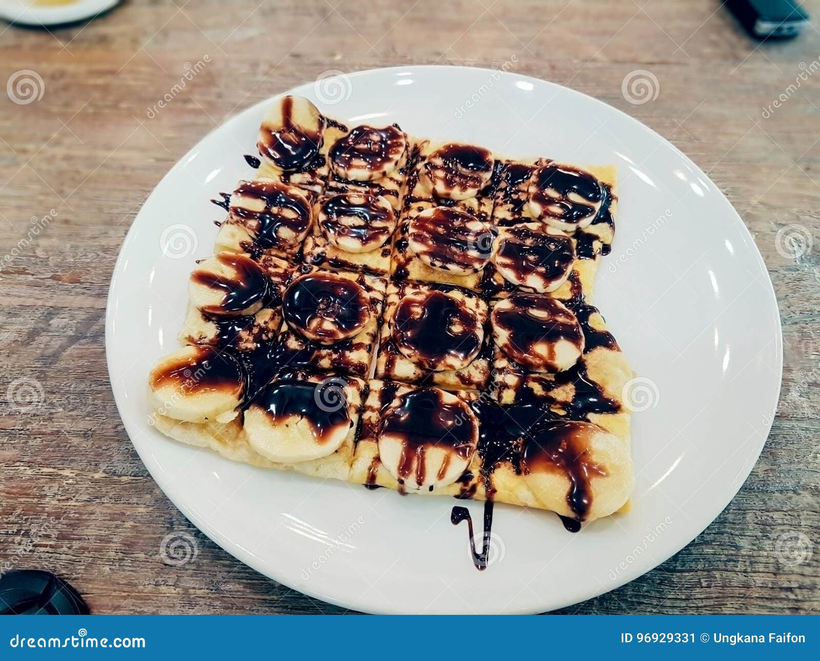 Roti topped with banana. stock image. Image of bread - 96929331