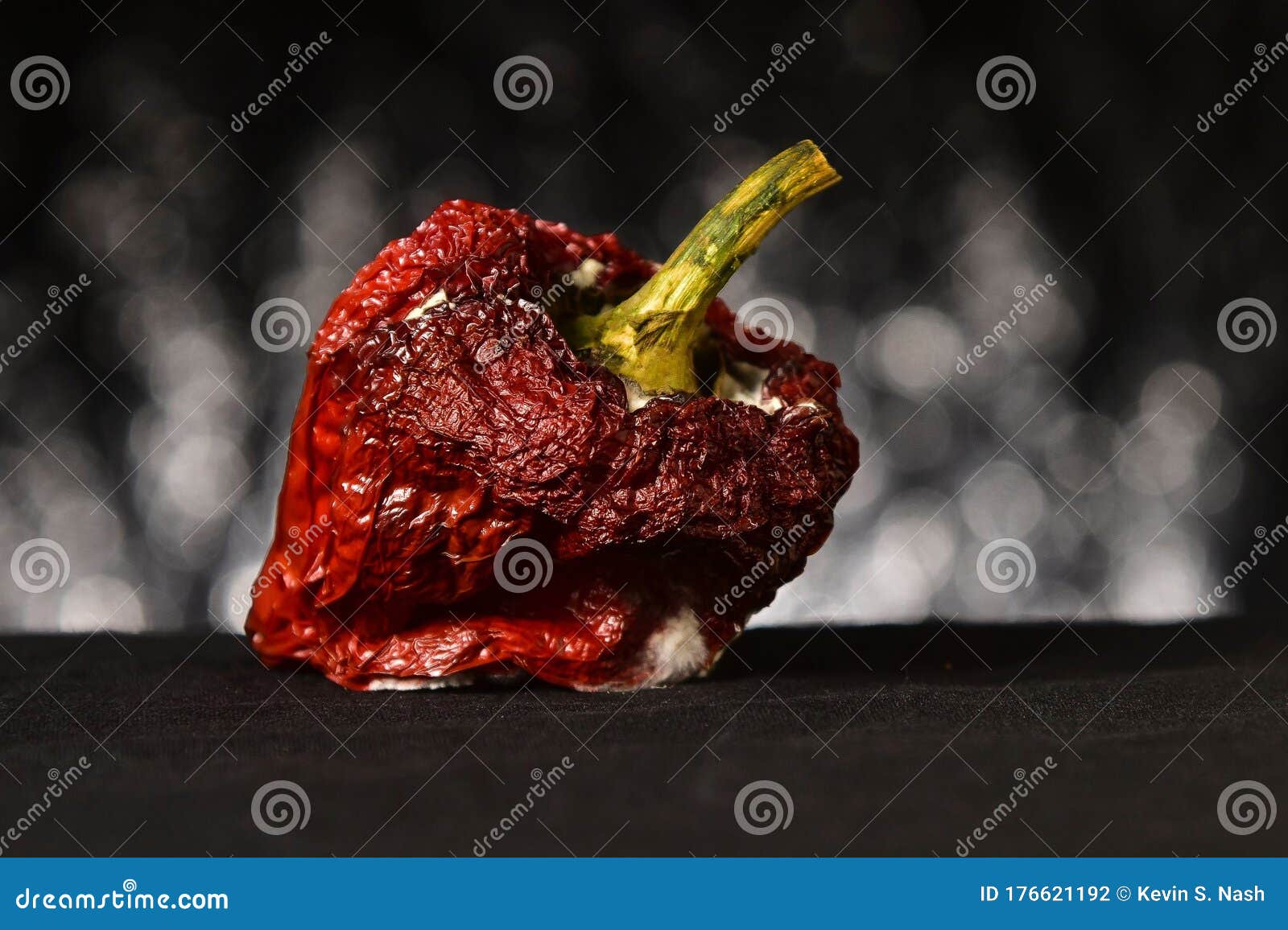 Dry Wilted Red Bell Pepper Grows In The Field. Vegetable Disease ...