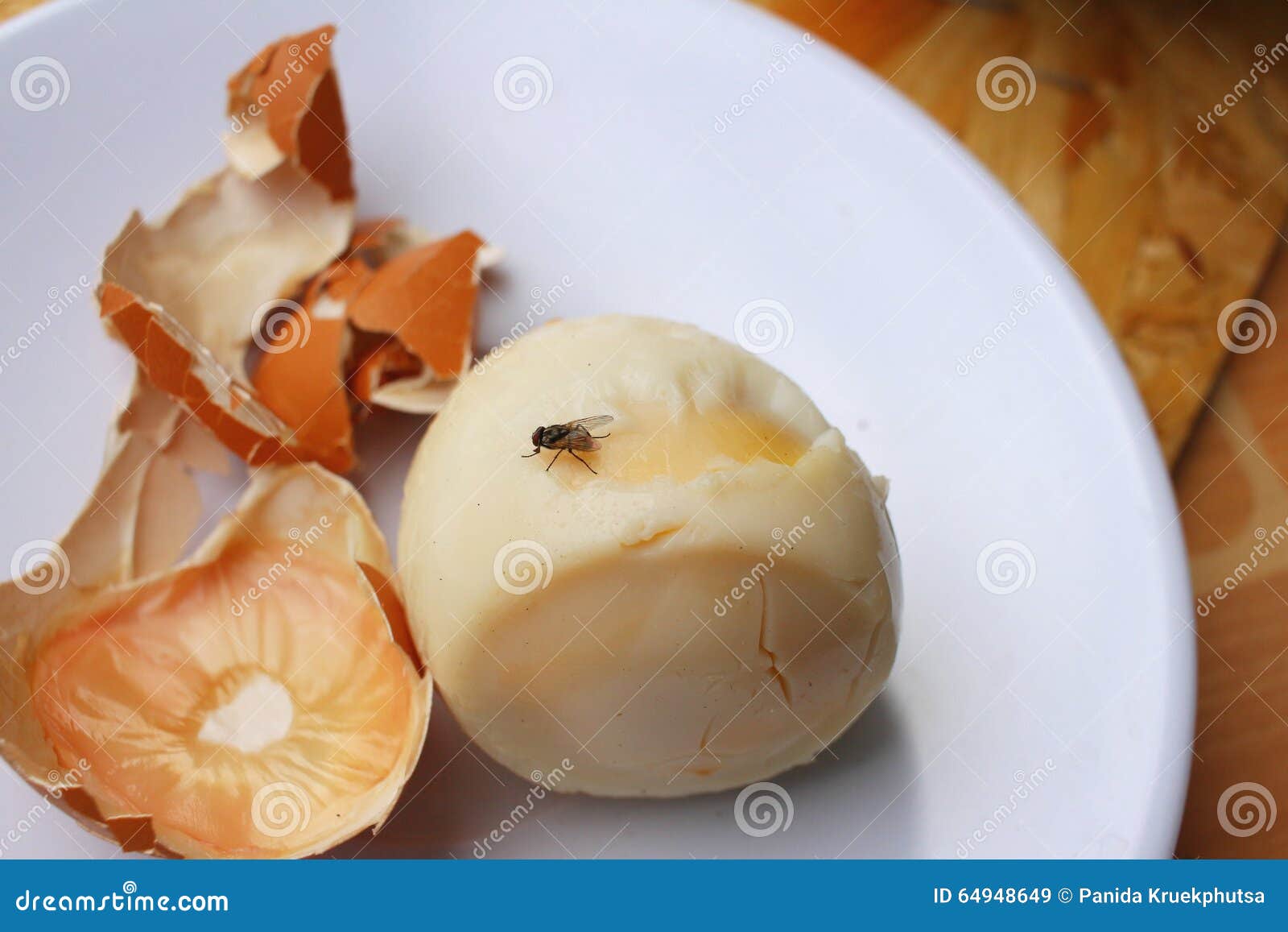Rotten Egg in White Plate on Wood Background. Stock Image - Image of ...