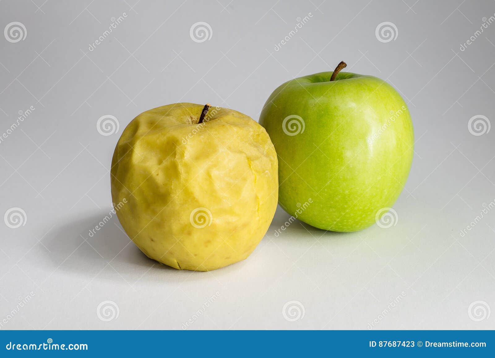 A Rotten And A Fresh Red Apple Next To Each Other. Good Vs Bad ...