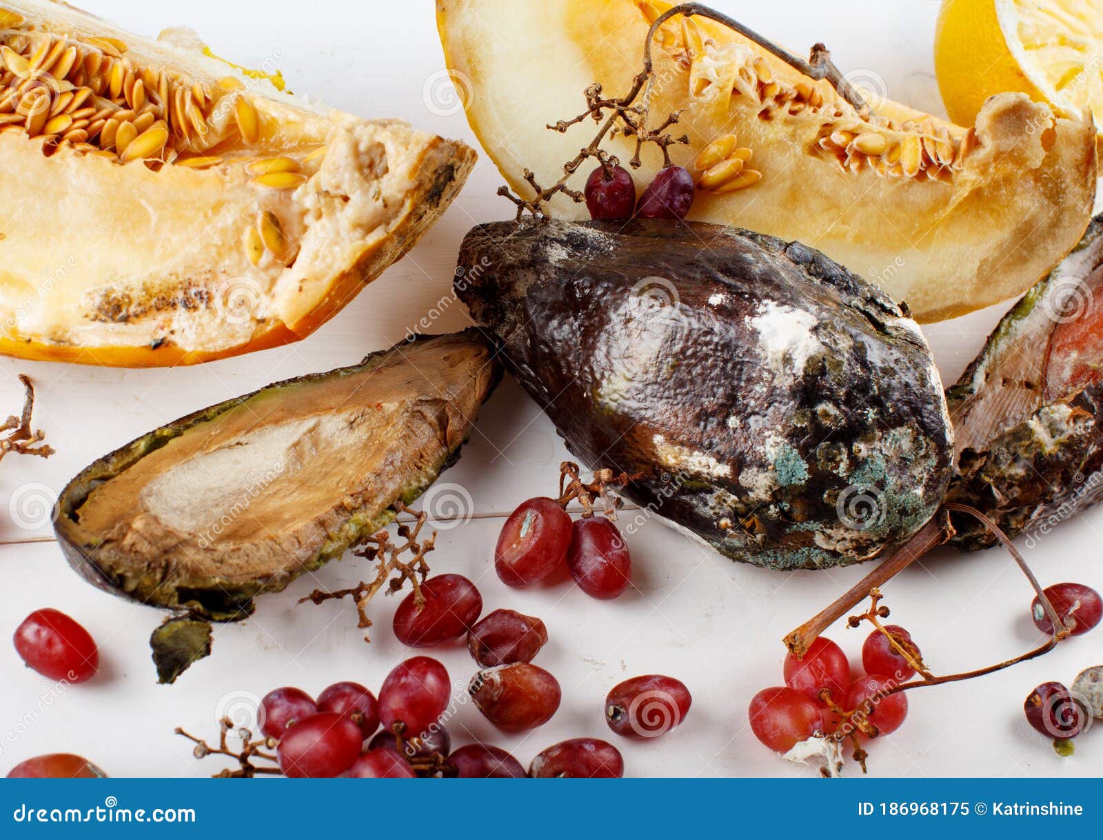 Rotten Fruits Pomegranate, Persimmon, Orange In Blue Garbage Bag ...