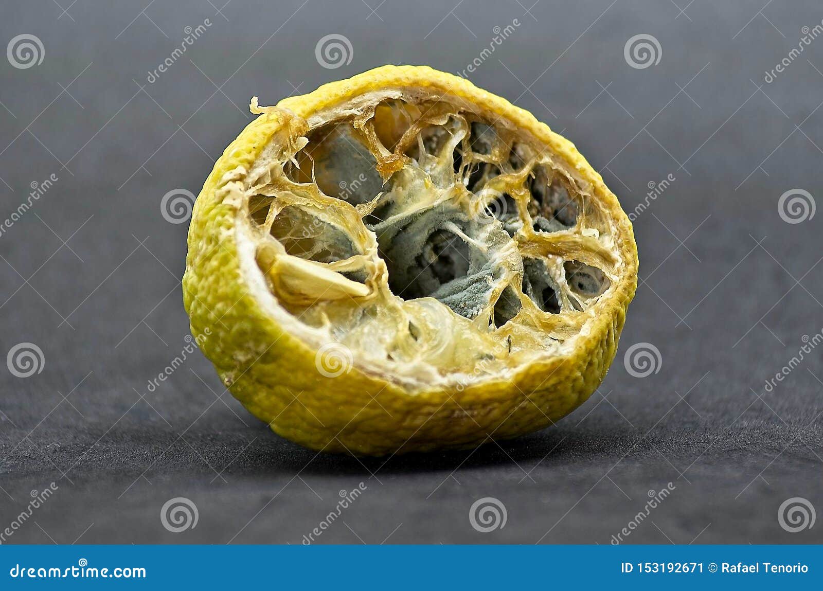 Rotten Half Lemon Over Black Background Royalty-Free Stock Photography ...