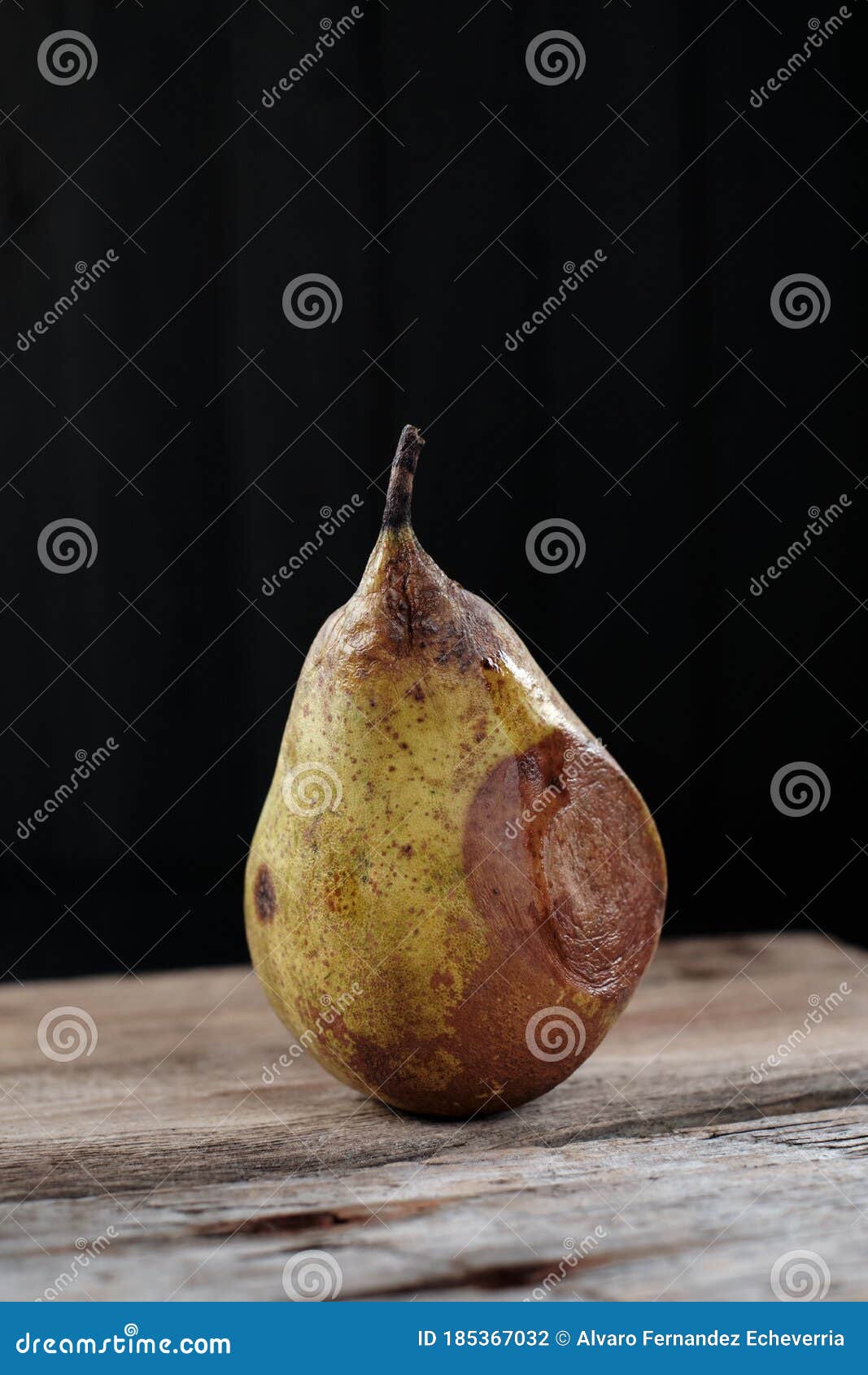 A Rotten Pear, in Poor Condition for Consumption Stock Photo - Image of ...