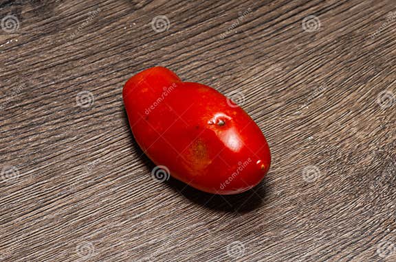 Rotten Spoiled Tomato on the Table Stock Photo - Image of decay, pink ...