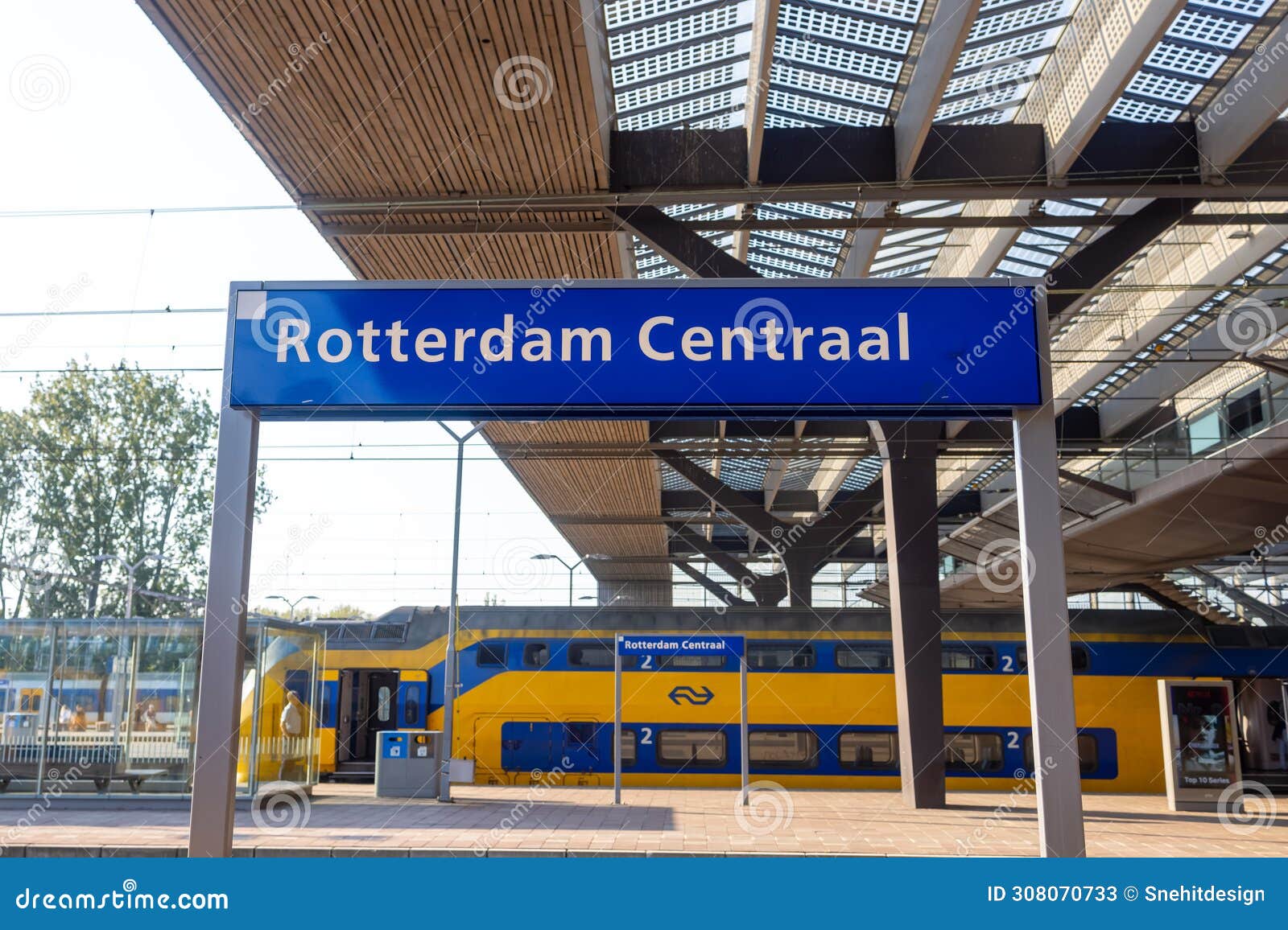 Rotterdam Centraal Sign and Train at the Platform, Rotterdam Centraal ...