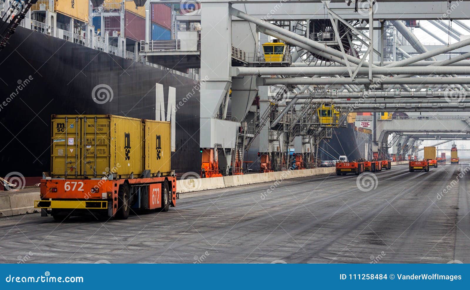 AGV Automated Guided Vehicle On Quay Alongside A Ship In The Port Of ... AGV Automated Guided Vehicle On Quay Alongside A Ship In The Port Of ...