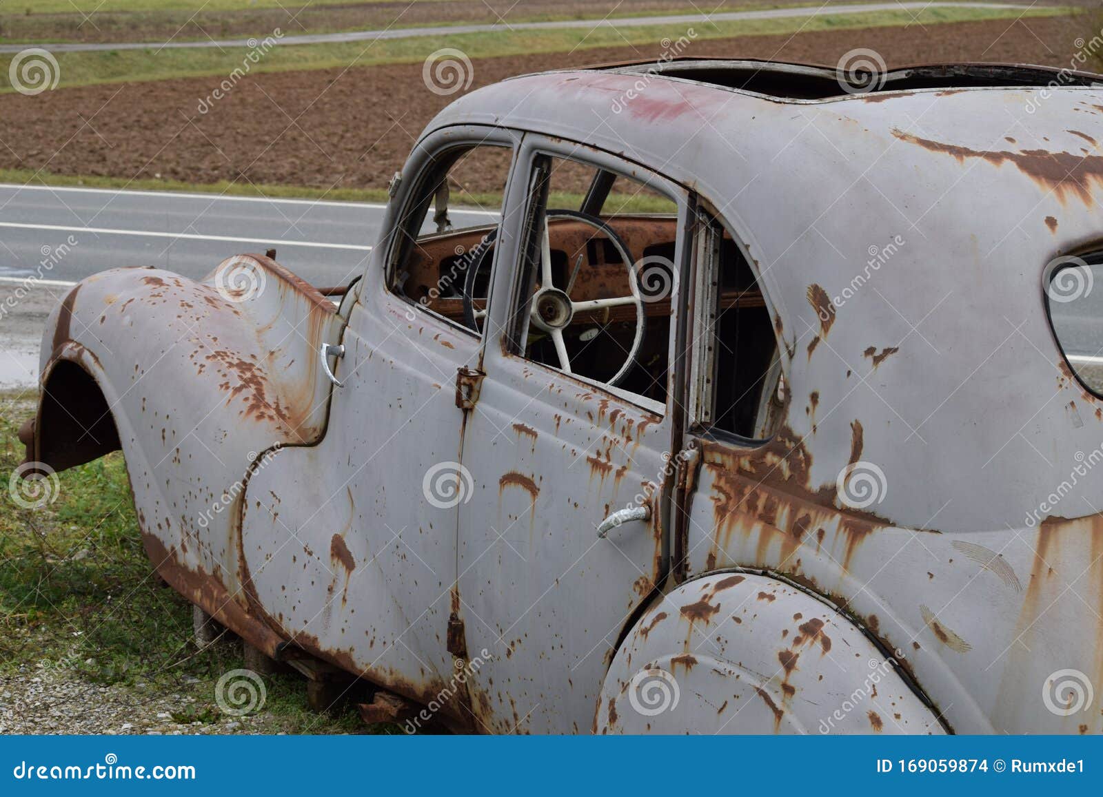 A Rotting Car on the Side of the Road Stock Photo - Image of wreck ...