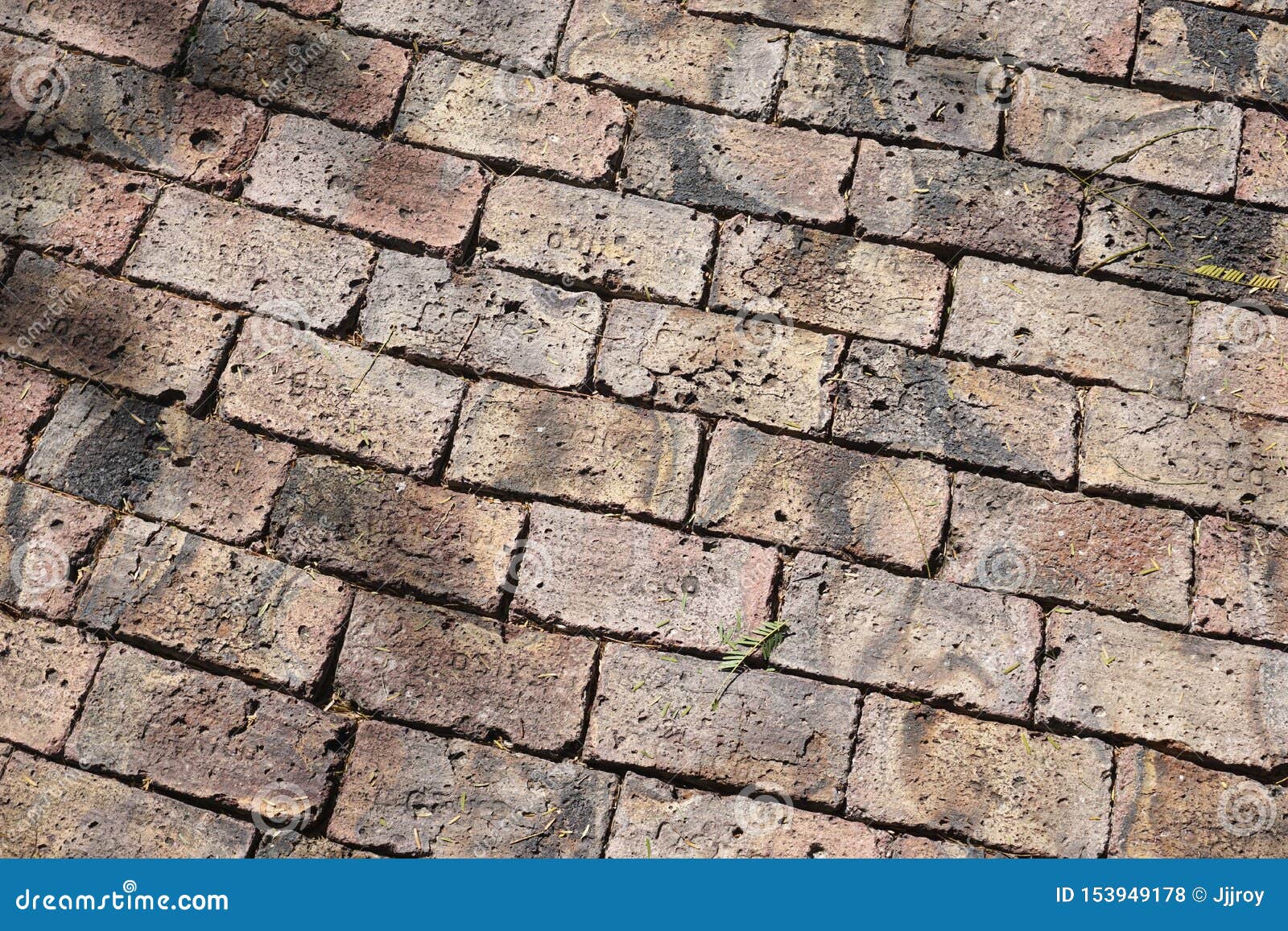 Rough Brick Pavement with Dark Cracks Forming Irregular Grid Stock ...