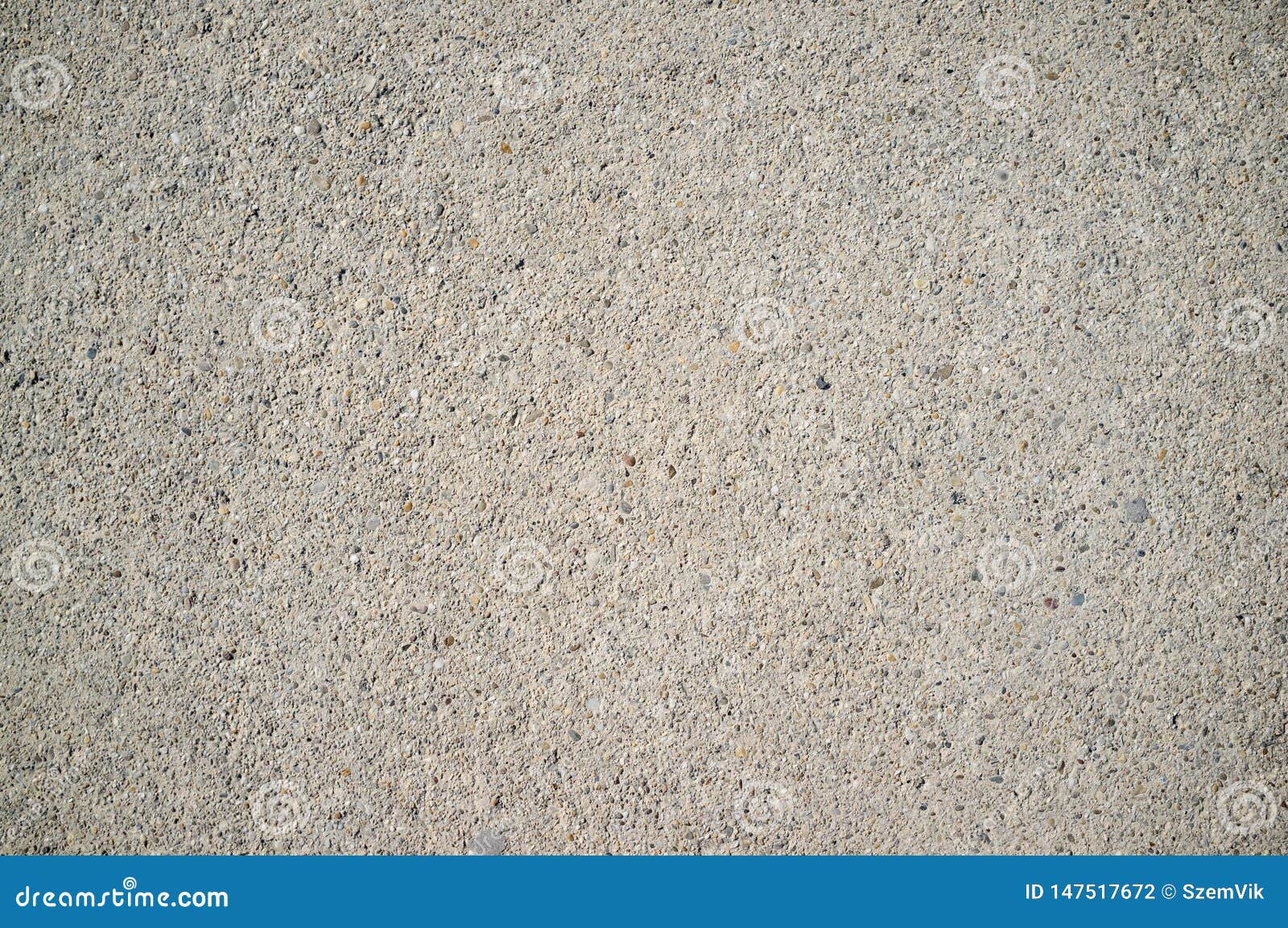 Rough Concrete Wall Texture with Small, Grey Rocks Embedded in Surface ...