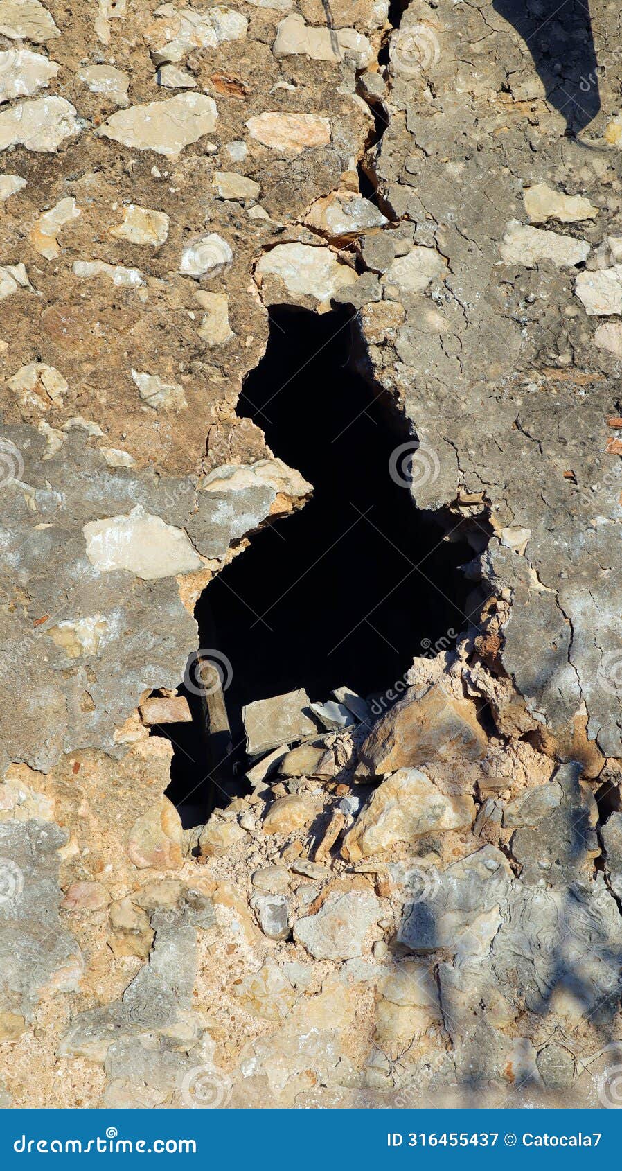 Rough Hole, Break in an Old Wall Made of Clay and Stone Stock Image ...