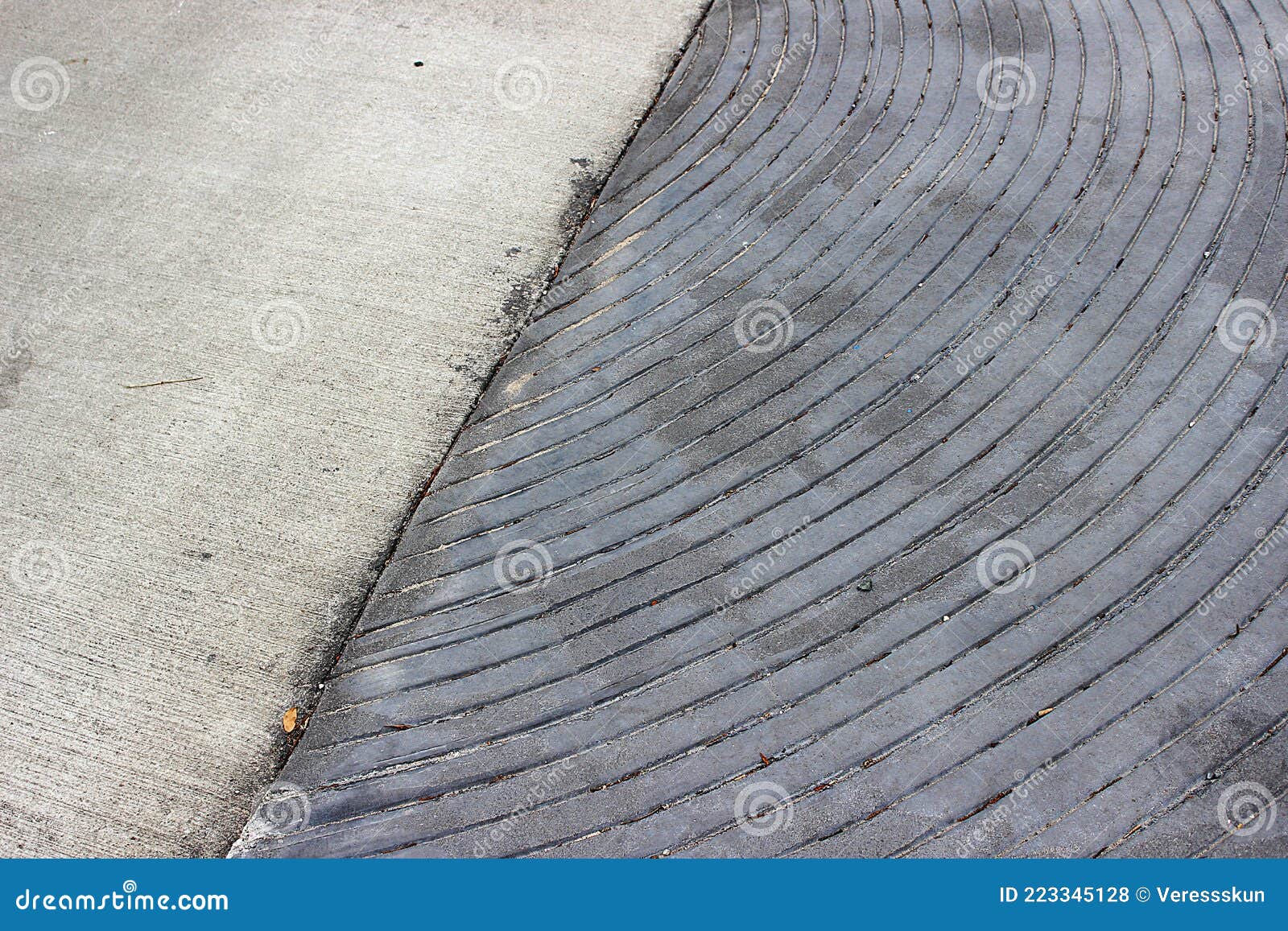 A Rough Road Made of Stones on the Border with Asphalt. Stock Photo ...