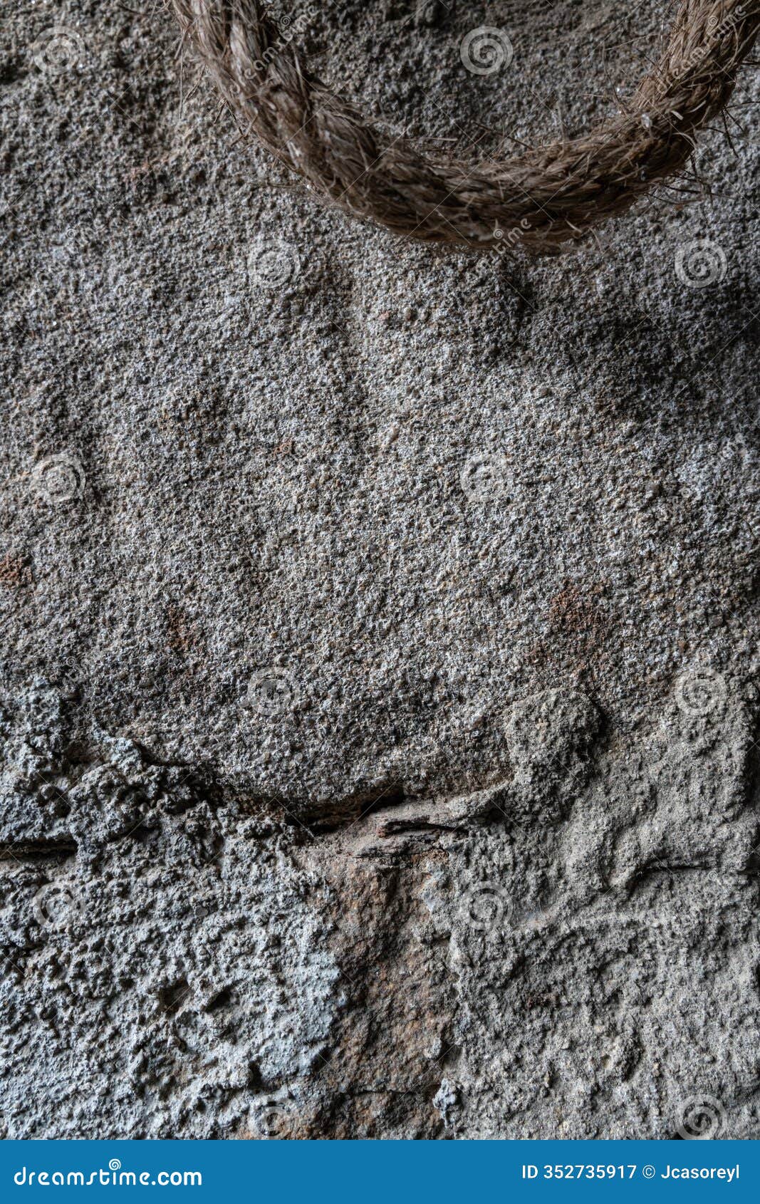 Rough Rope Hanging on Textured Stone Wall Background Stock Image ...