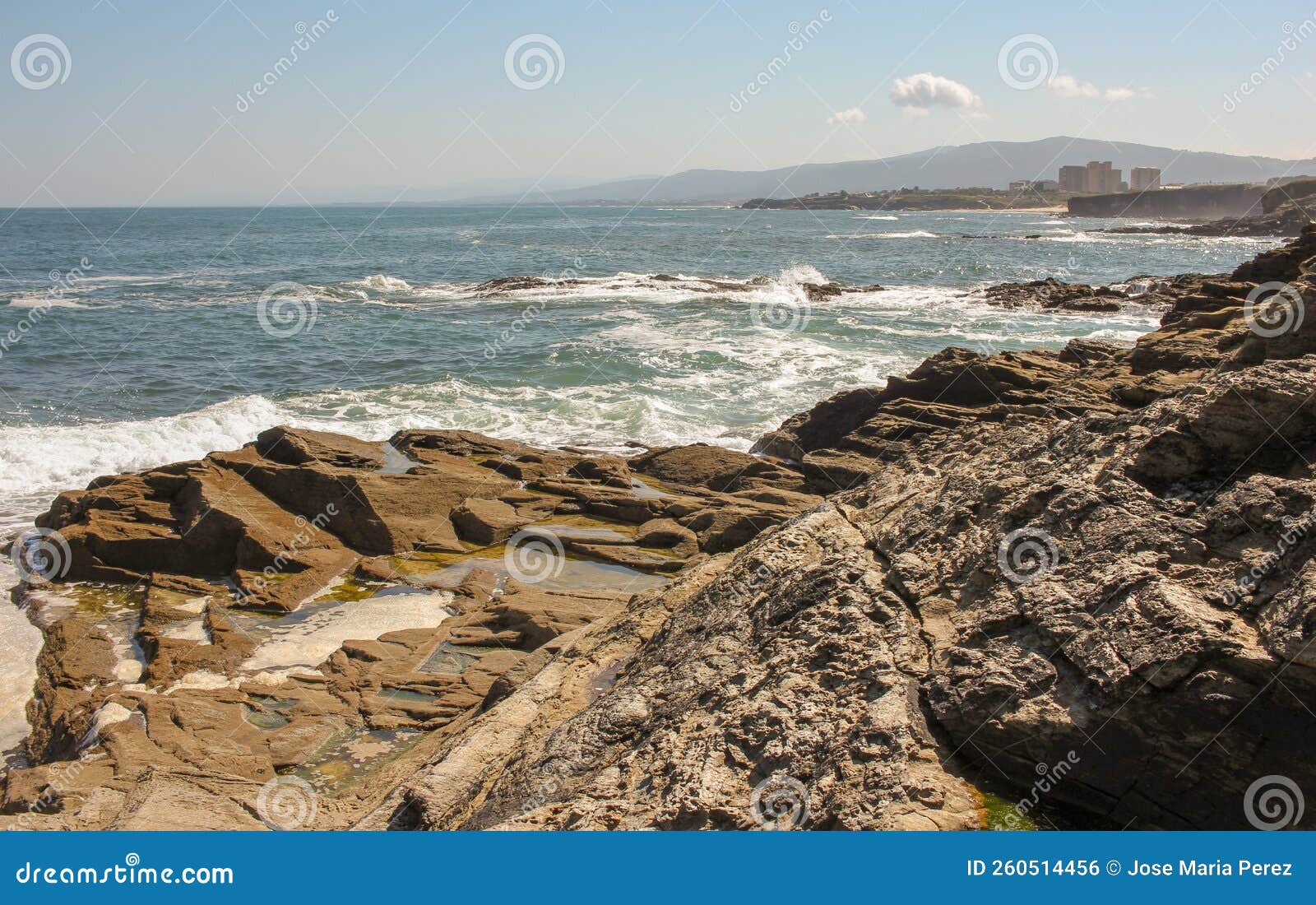 Sea seen from the rocks stock photo. Image of water - 260514456