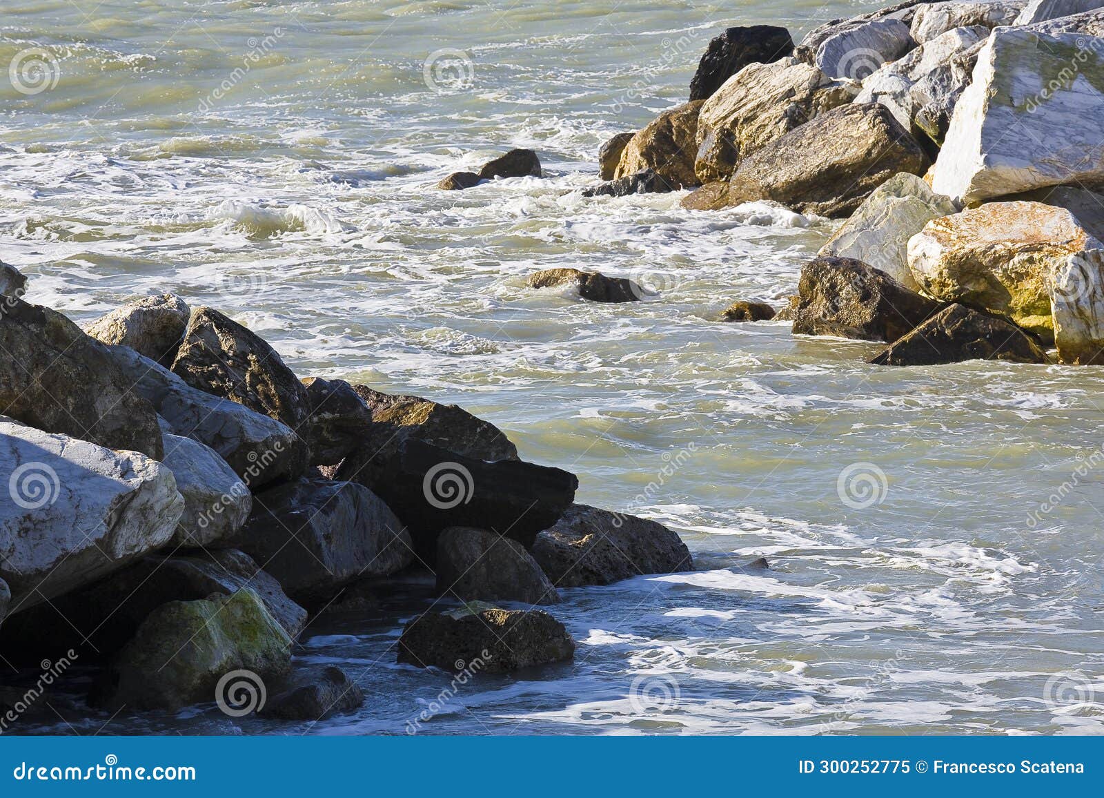 The Rough Sea - Storm with Waves and Barrier of Rocks To Protect from ...