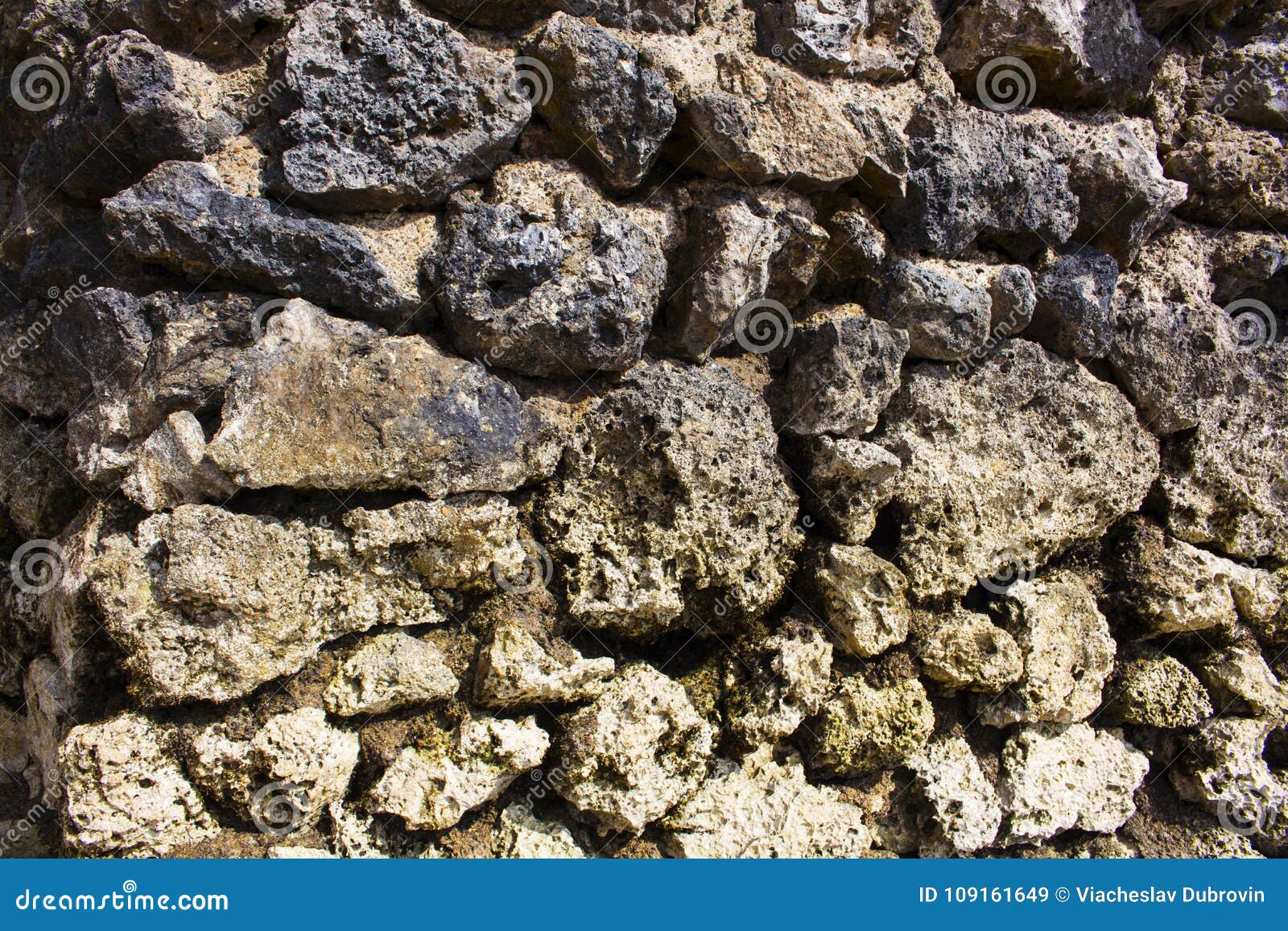 Rough Stone Solid Wall Closeup Photo. Stone Wall Texture. Rustic Stone ...