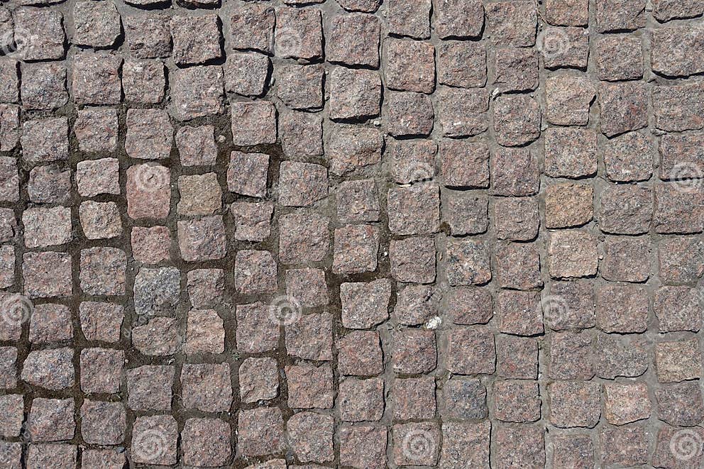 Rough Surface of Pavement Made of Pink Granite Stone Setts Stock Photo ...