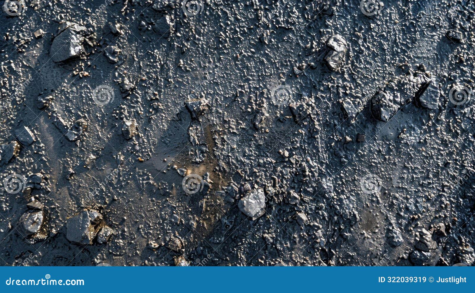 A Rough Textured Surface of Asphalt with Small Dark Spots and Streaks ...