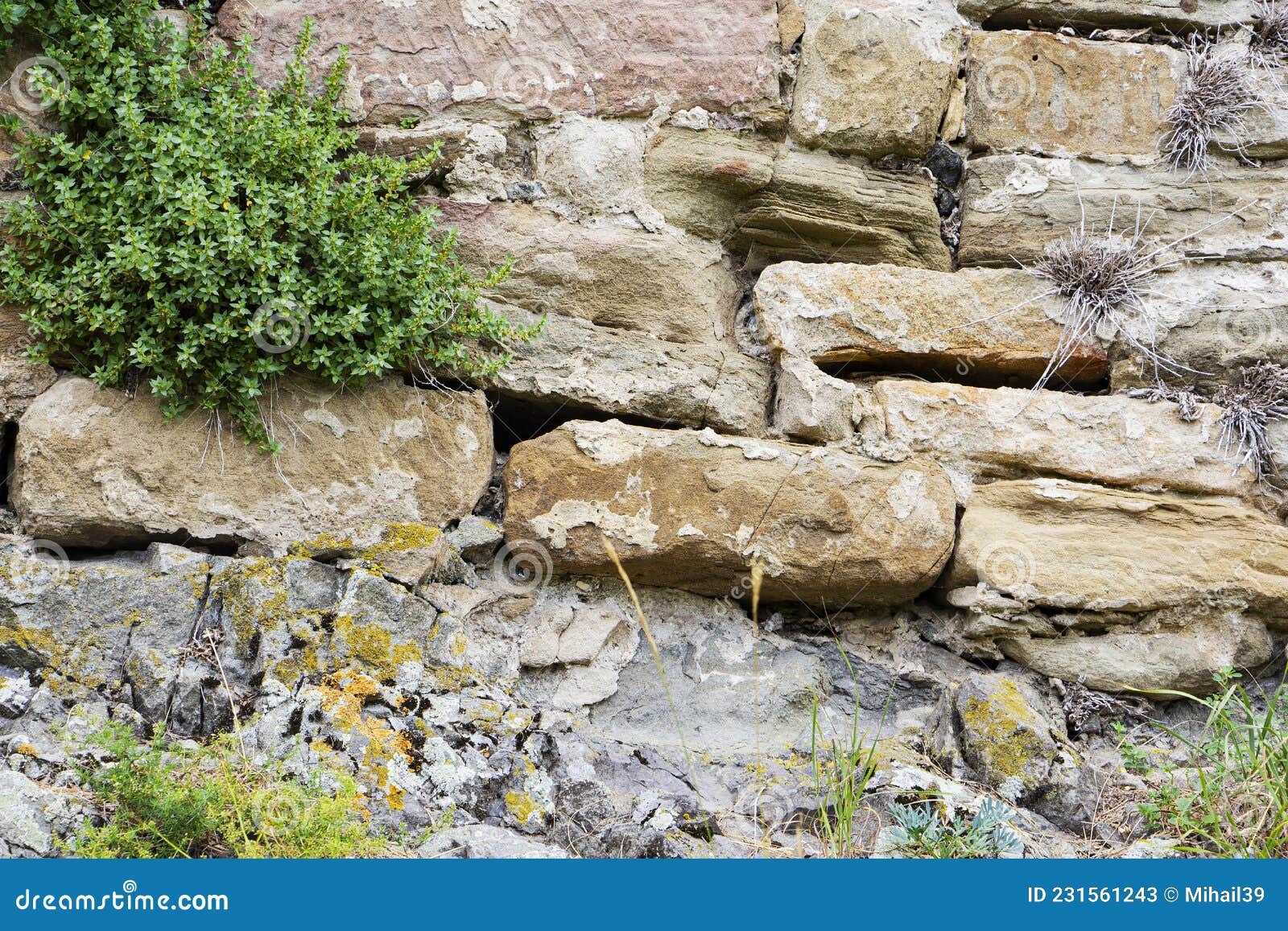 The Rough Textured Surface of the Wild Stone Wall. Background. Stock ...