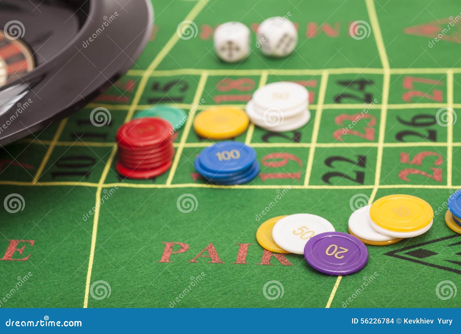Roulette in Casino ,chips and Dices Stacking on a Green Felt Stock ...
