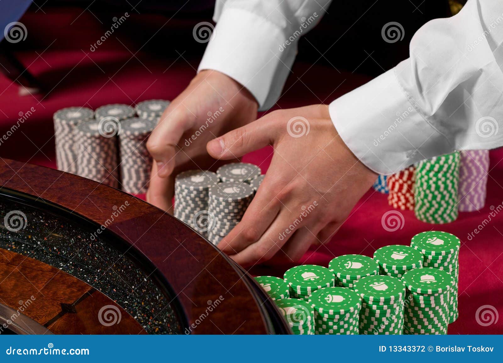 Roulette and chips stock photo. Image of closeup, hands - 13343372