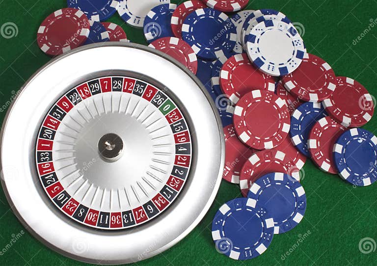 Roulette Wheel and Chips on Green Beize Stock Photo - Image of objects ...