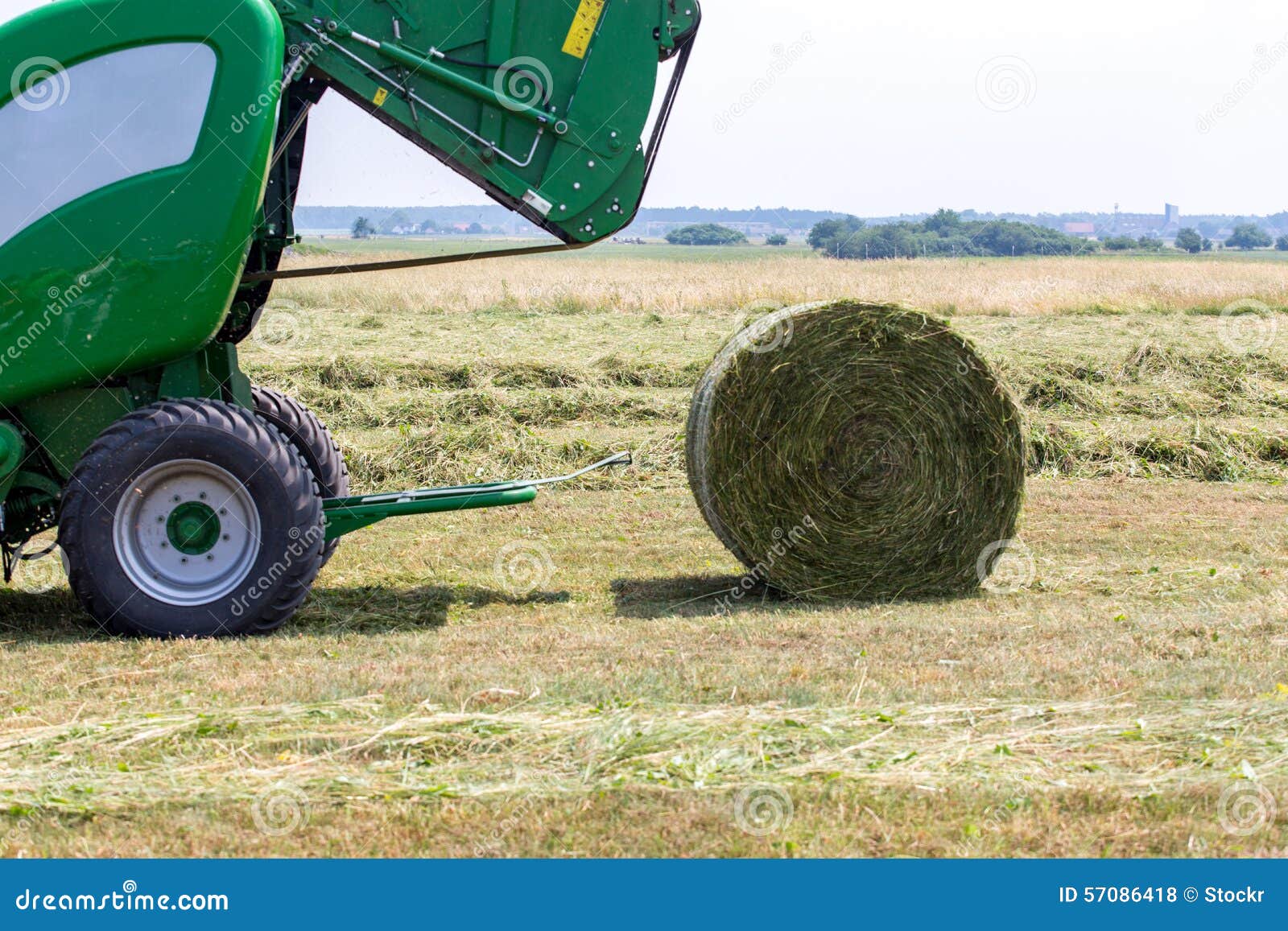 Round baler stock photo. Image of machinery, circle, bale - 57086418