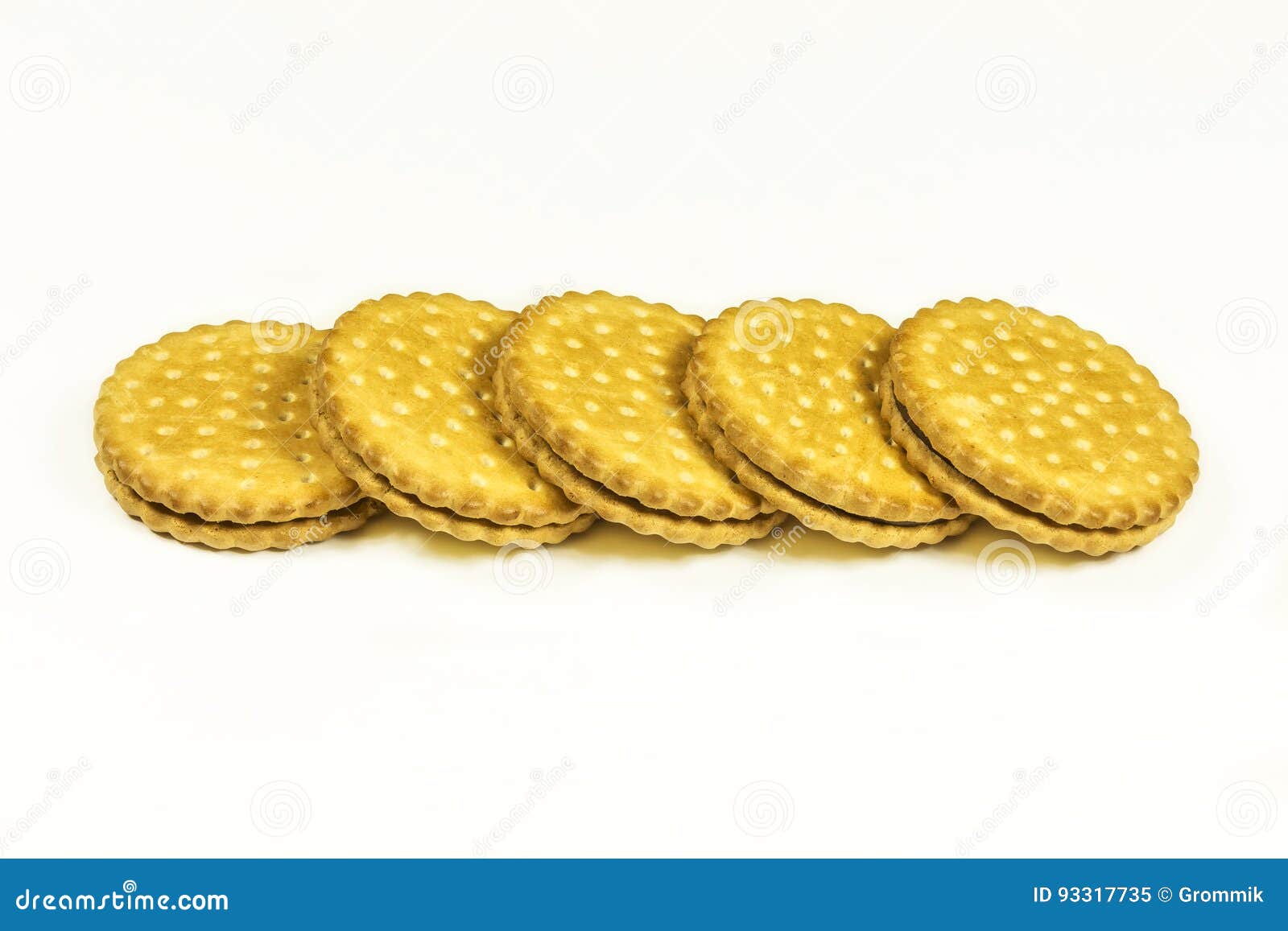 Round Biscuits with Chocolate Filling Lie on a Light Background Stock ...
