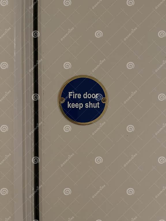Round blue fire door sign stock photo. Image of mandatory - 268128454
