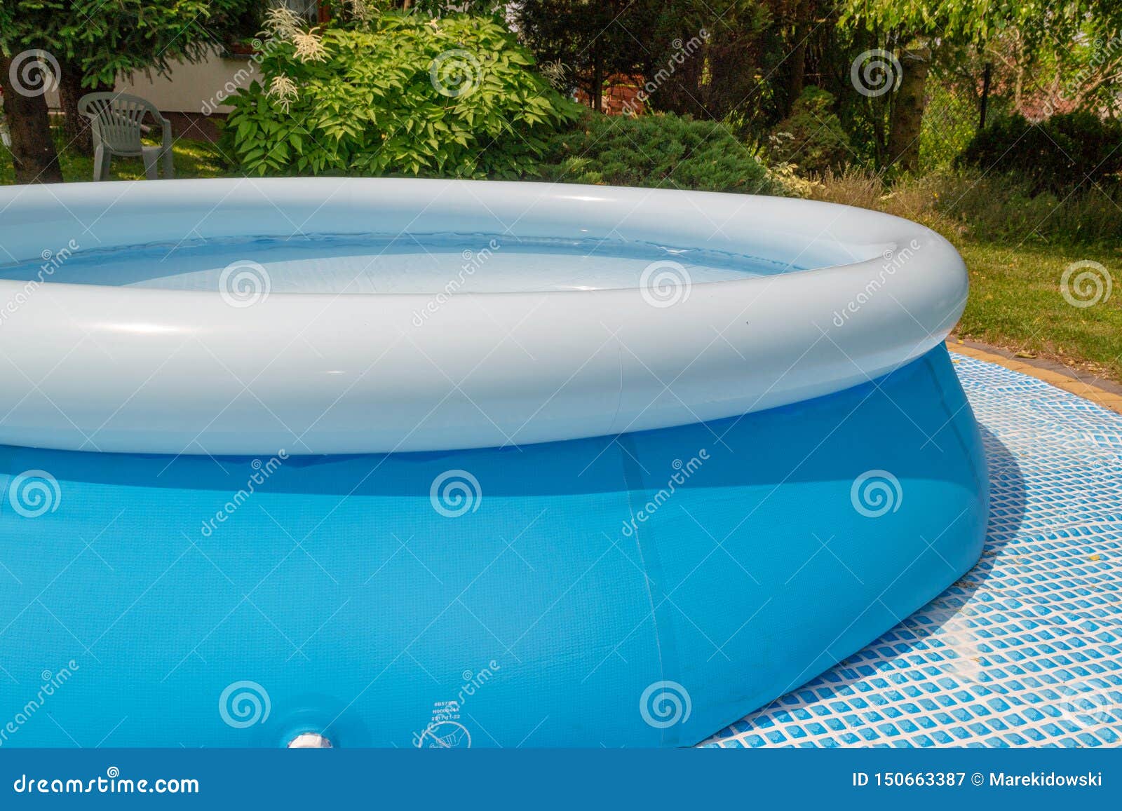 A Round, Blue, Garden Pool for Children. Stock Image - Image of blue ...