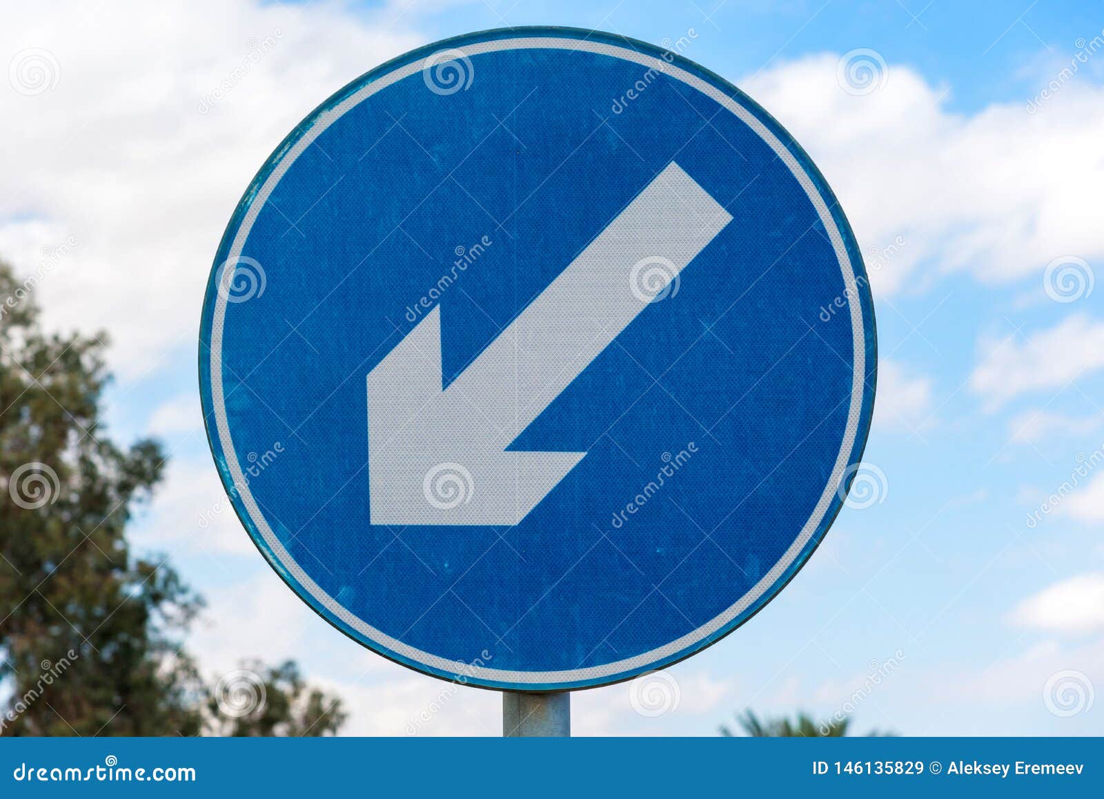 Round Blue Road Sign with White Diagonal Warning Arrow. Horizontal ...