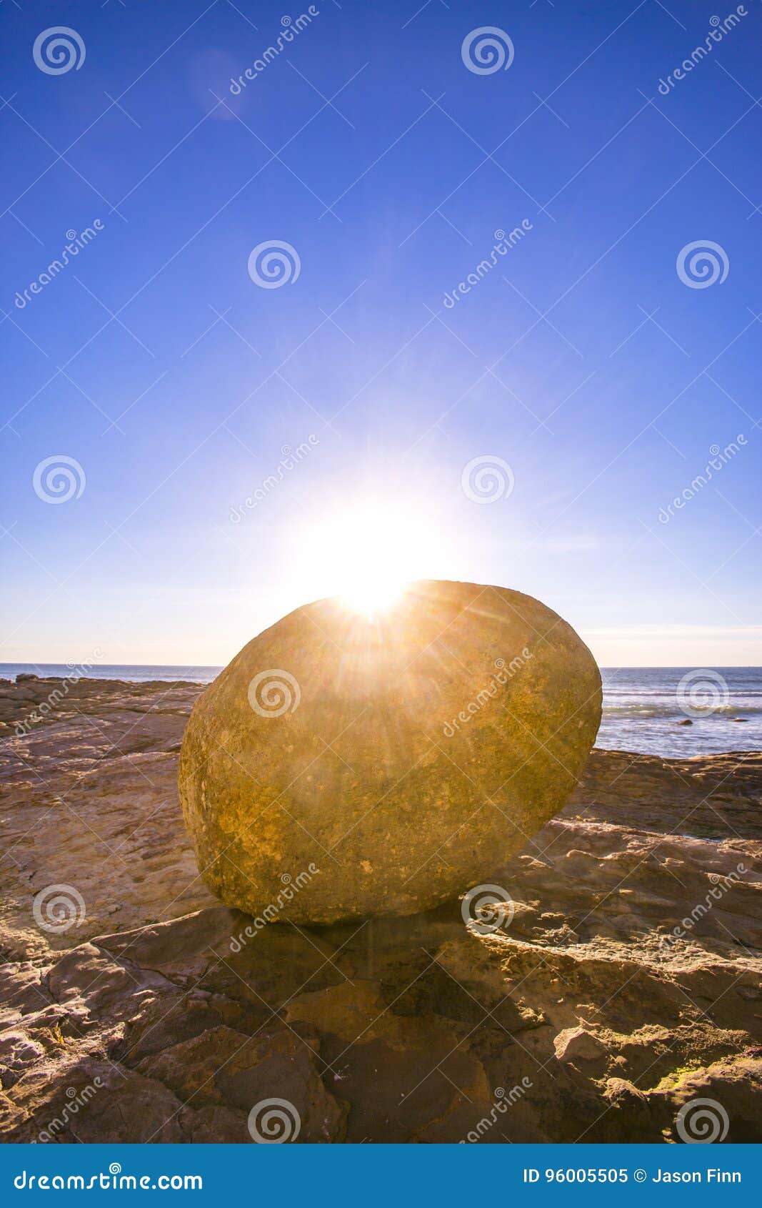 Round Boulder Right on the Shore Stock Image - Image of sunset, curves ...