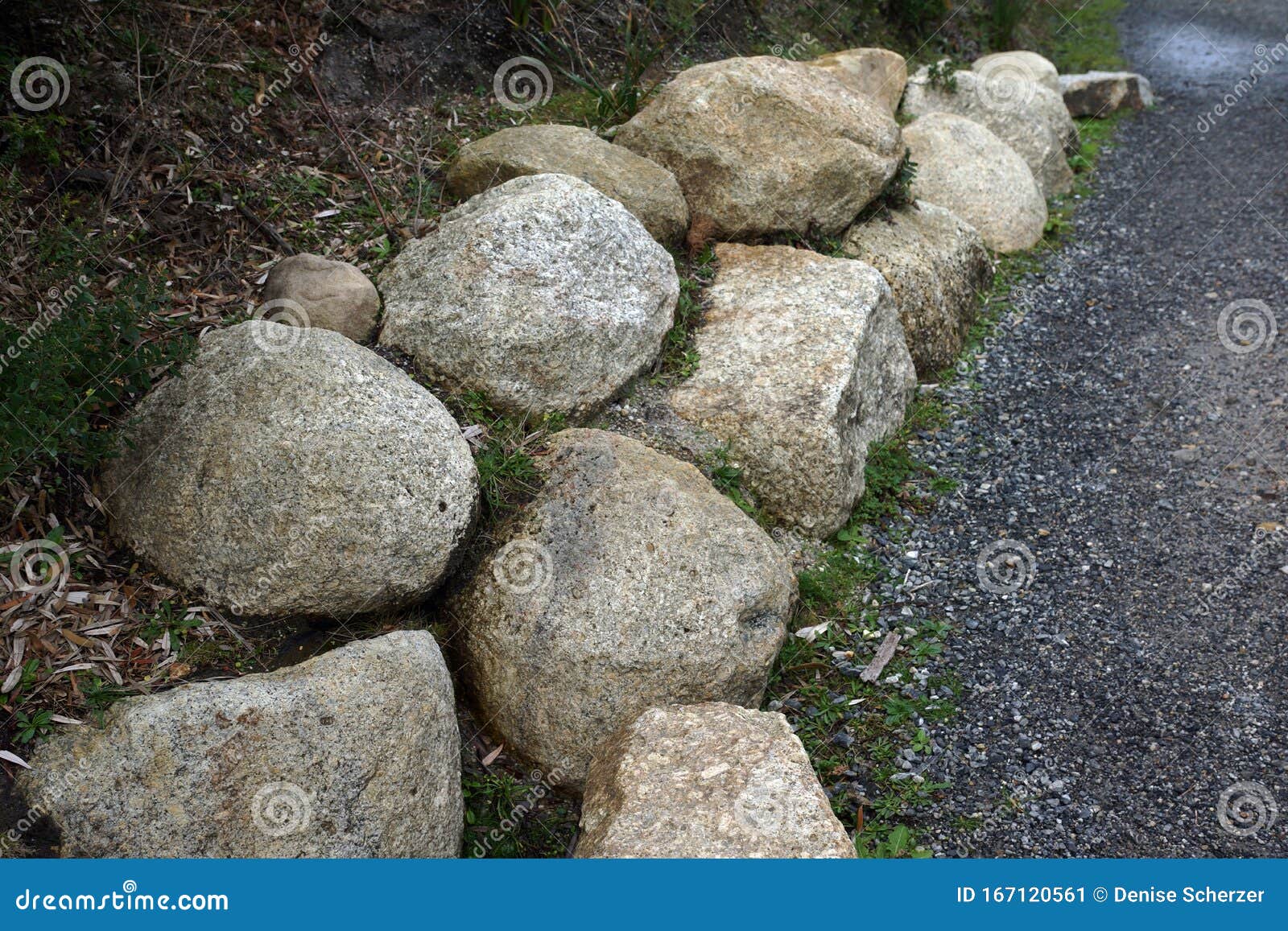 Round Boulder Stone Wall Along Path Edge Stock Image - Image of ...