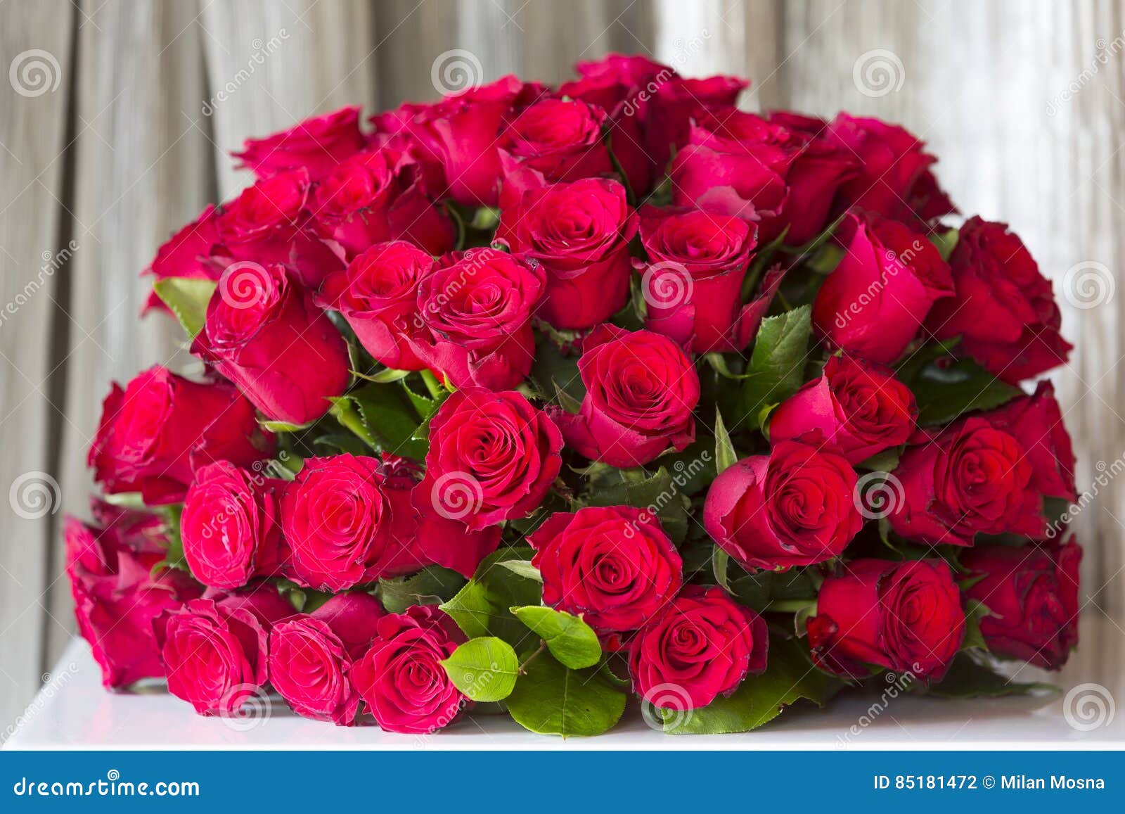 A Round Bouquet of Red Roses Stock Photo - Image of bouquet, blossoming ...