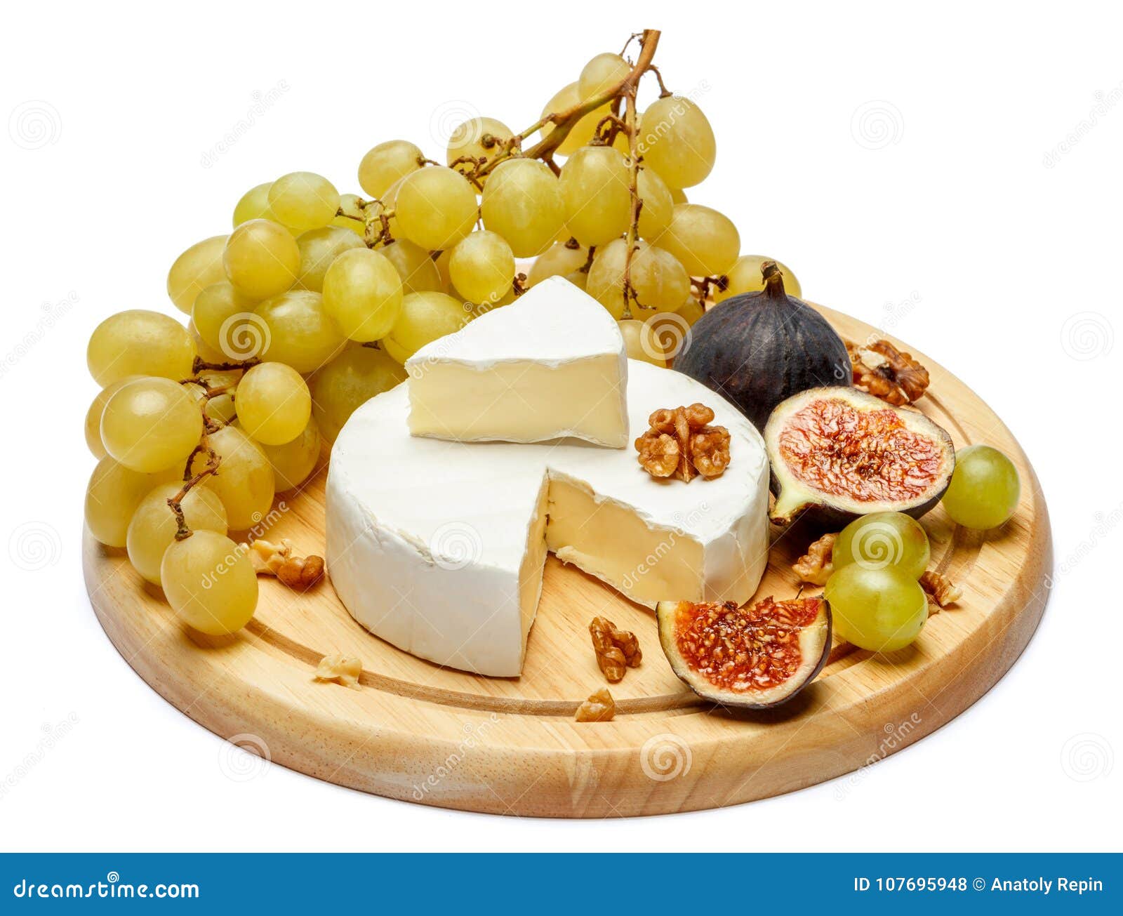 Round Brie or Camambert Cheese on Cutting Board White Background Stock ...