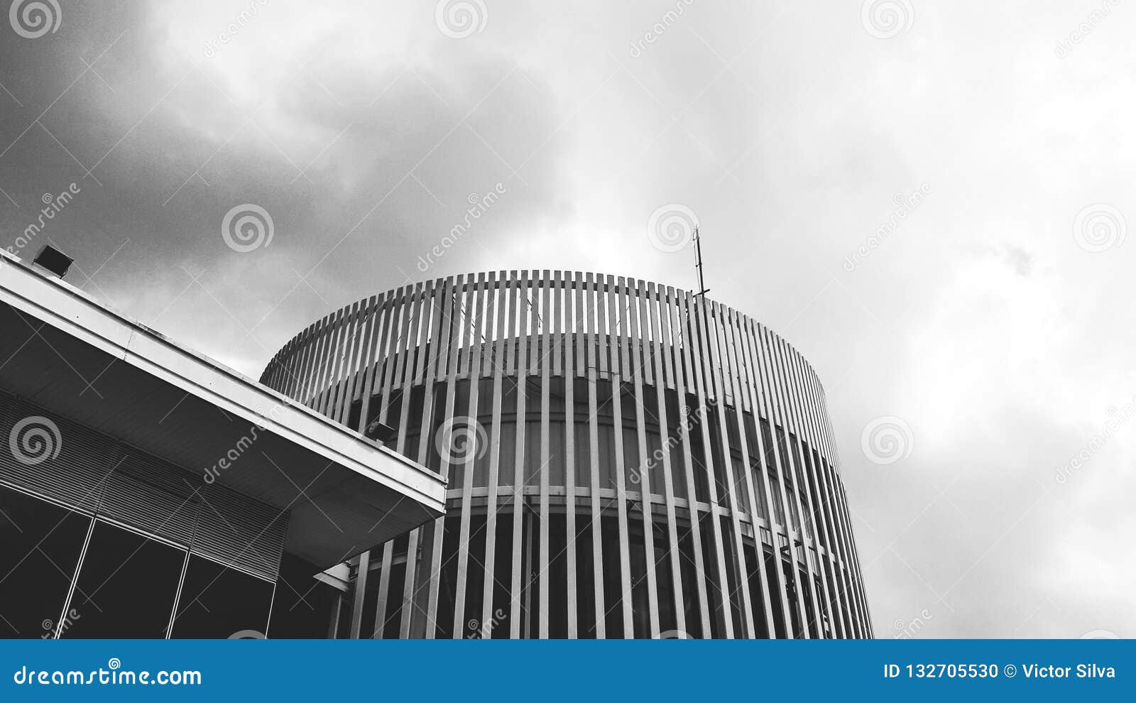 Round Building with White Background and Clouds Stock Photo - Image of ...