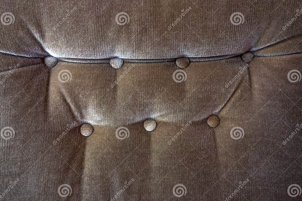 Round Buttons in the Soft Upholstery of the Sofa Stock Image - Image of ...