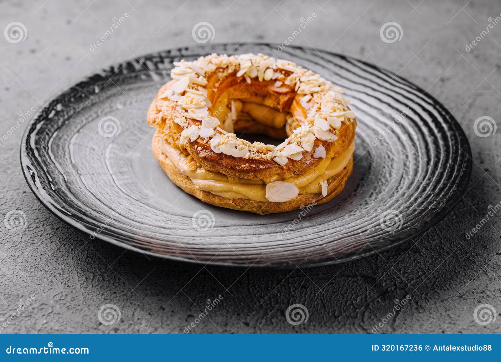 Round Cake with Mendal and Custard Stock Photo - Image of dessert ...